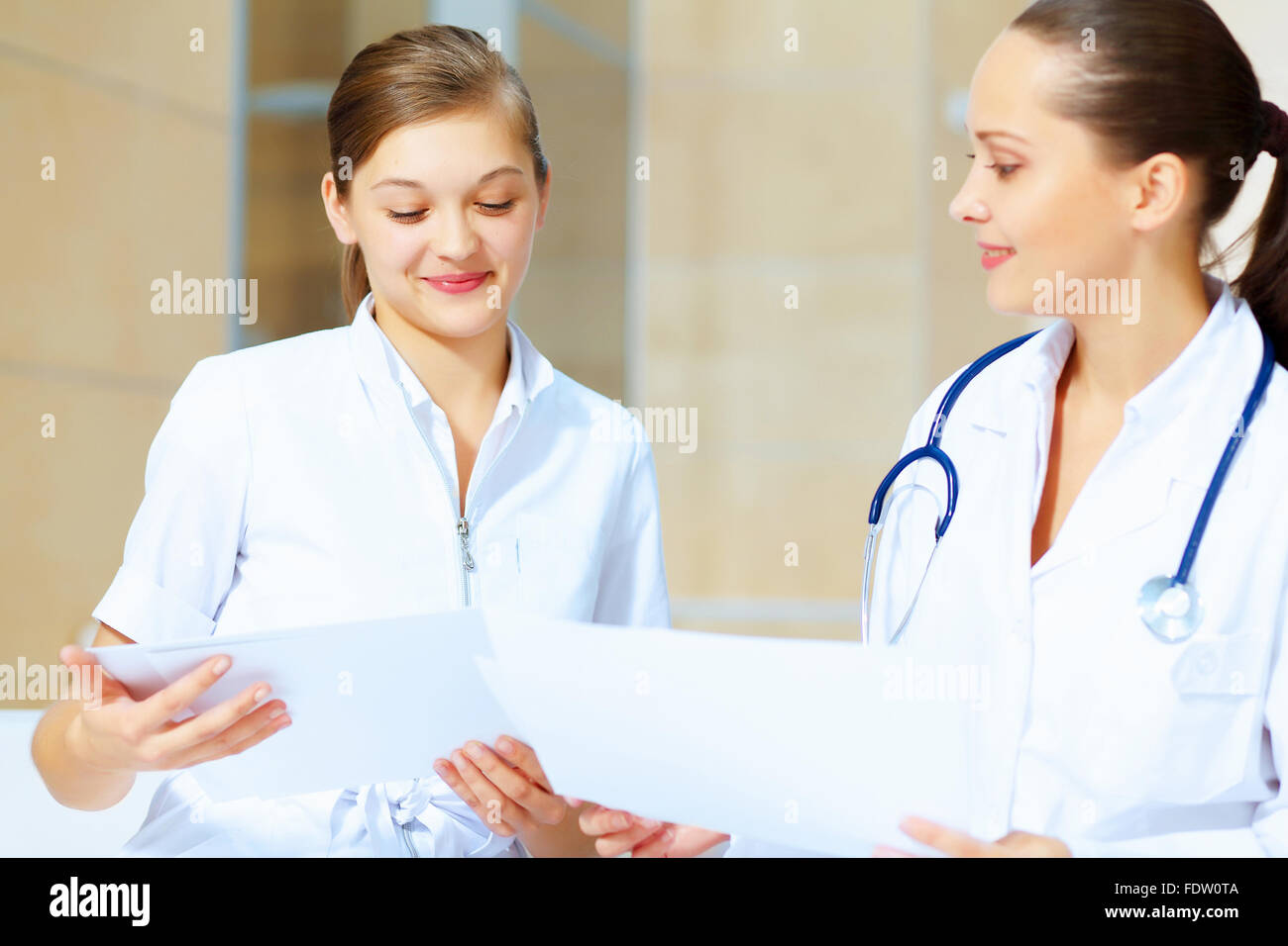 Female doctors discussing something hi-res stock photography and images ...