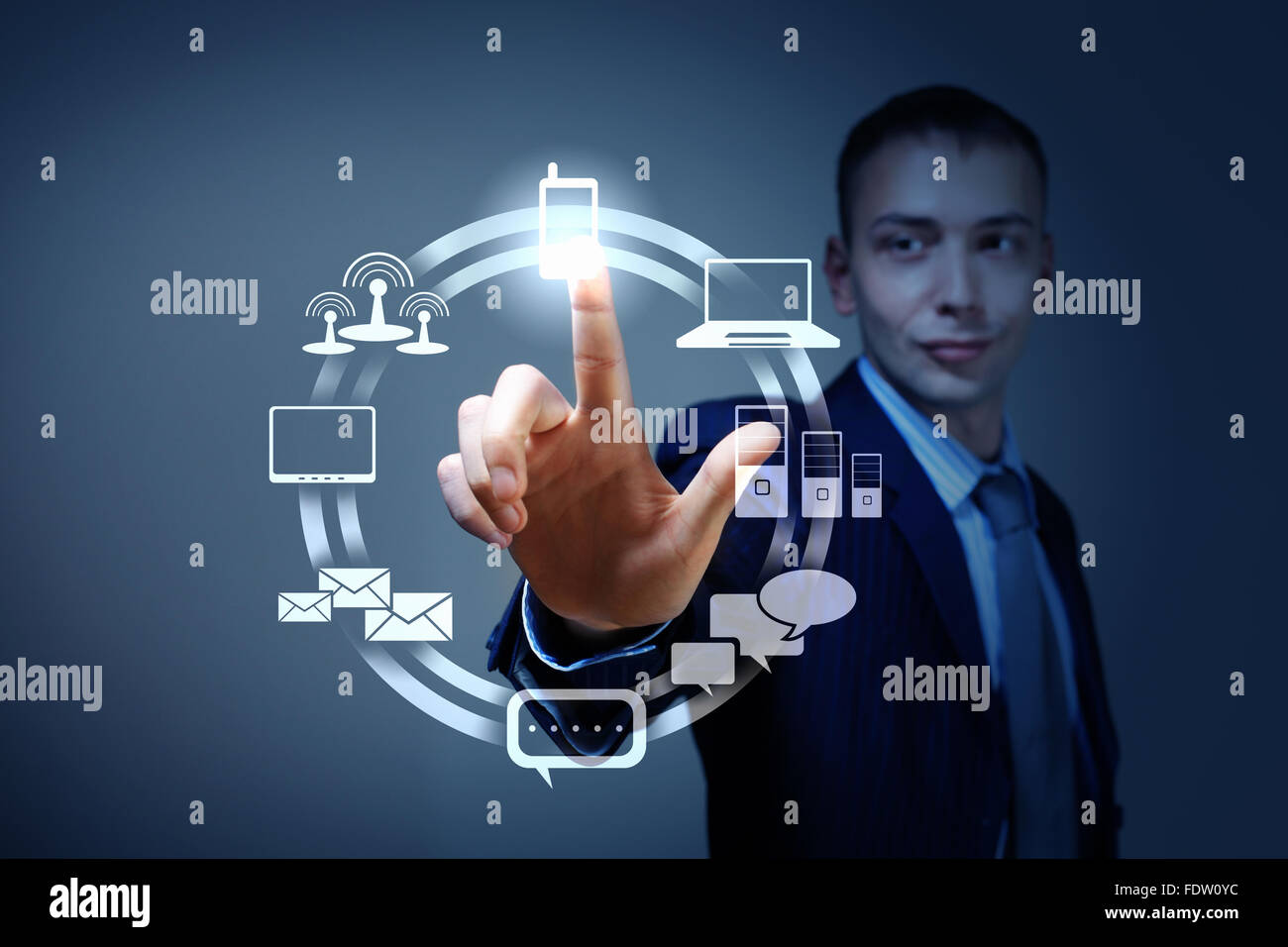 Business person pushing symbols on a touch screen interface Stock Photo ...