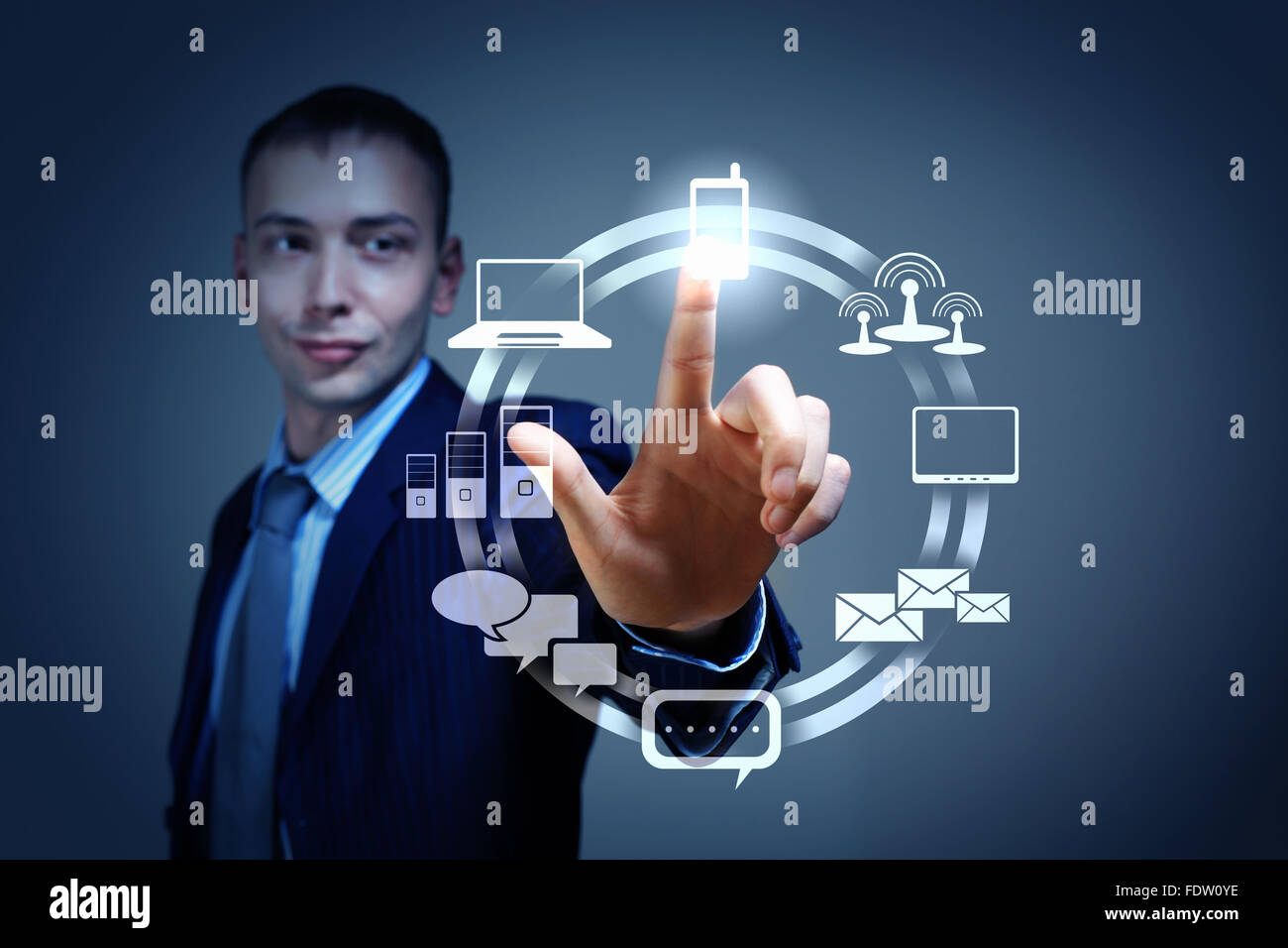 Business person pushing symbols on a touch screen interface Stock Photo ...