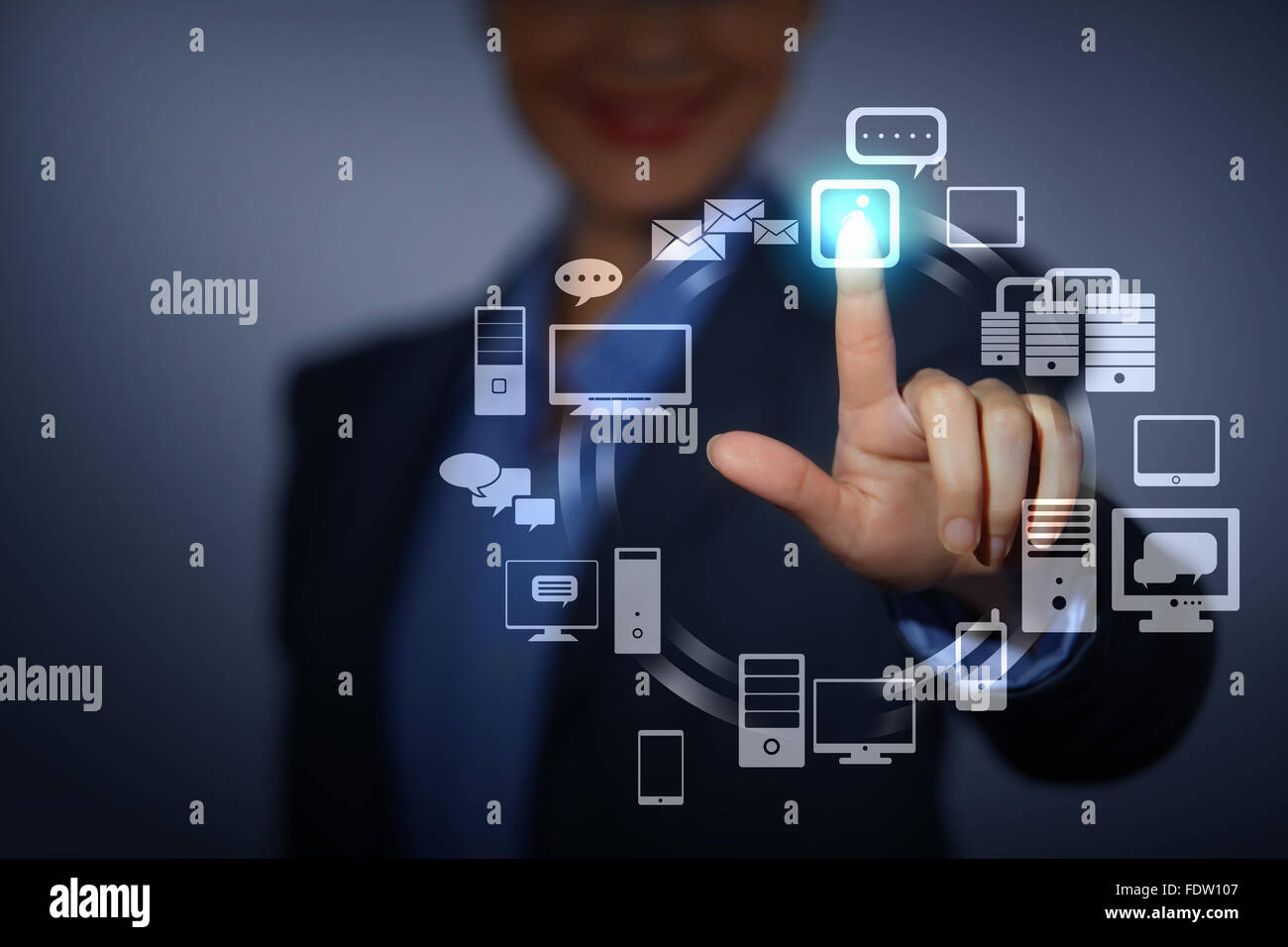Business person pushing symbols on a touch screen interface Stock Photo ...