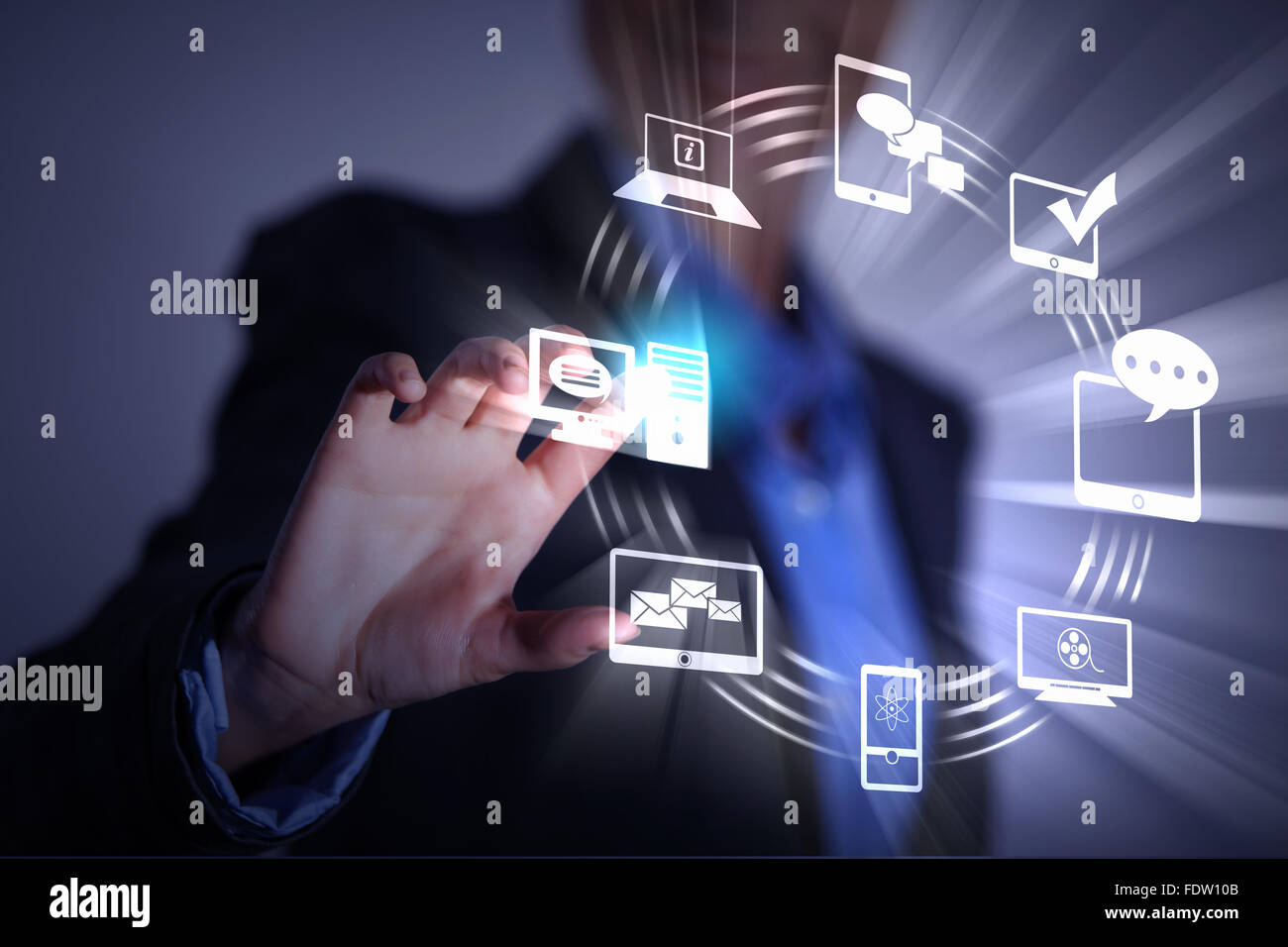 Business person pushing symbols on a touch screen interface Stock Photo ...