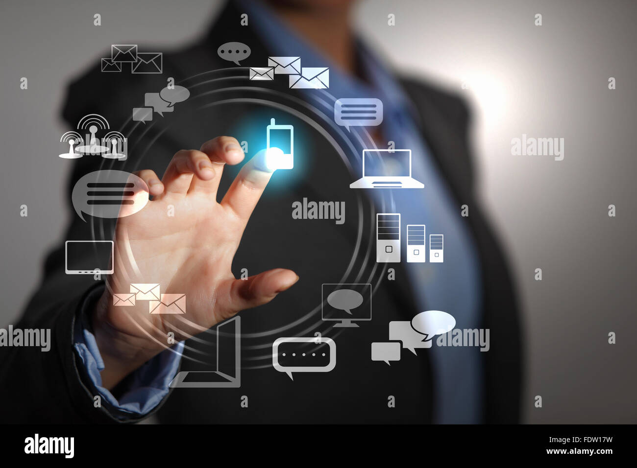 Business person pushing symbols on a touch screen interface Stock Photo ...