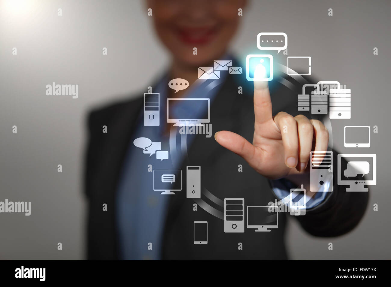 Business person pushing symbols on a touch screen interface Stock Photo ...