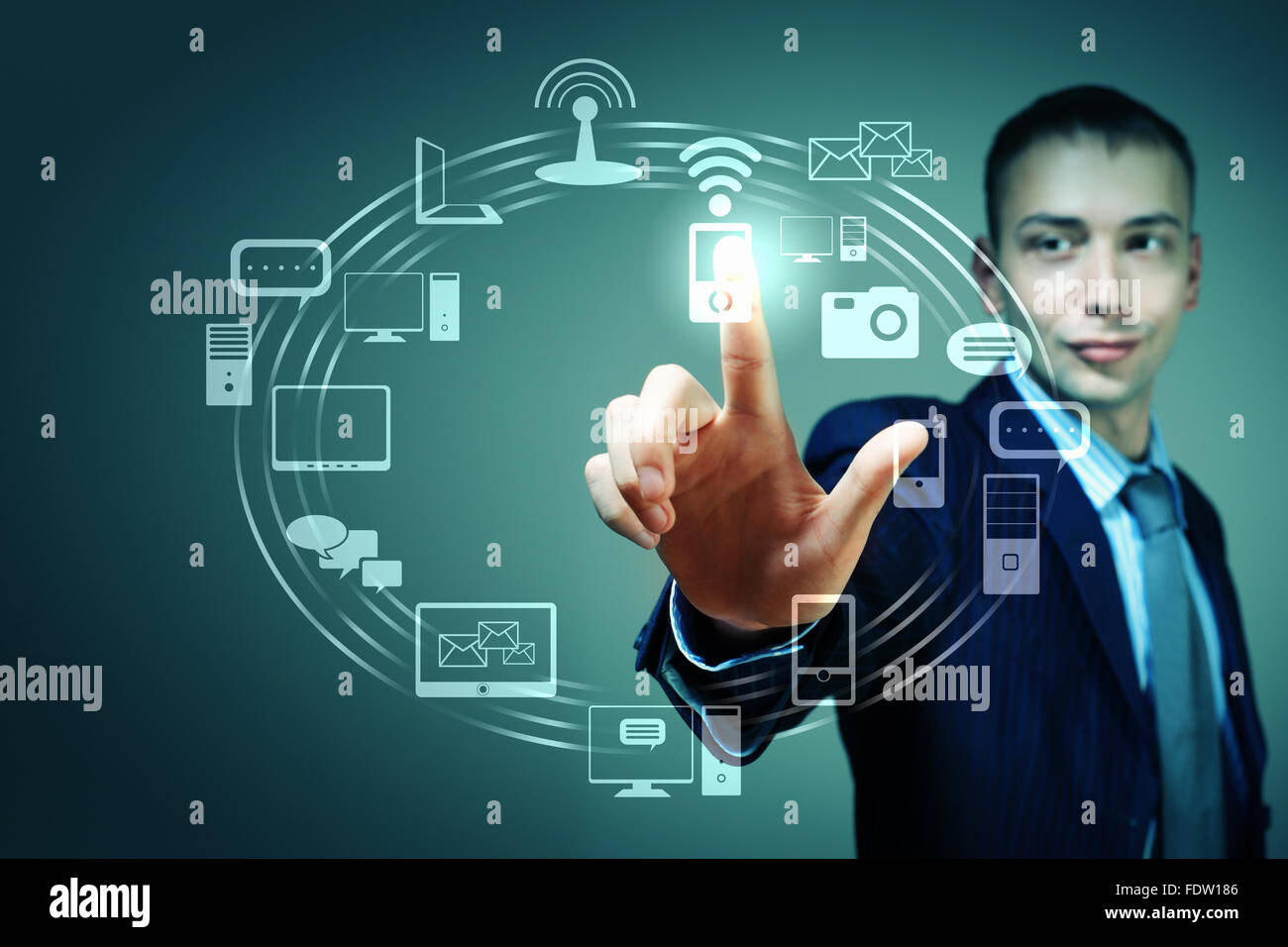Business person pushing symbols on a touch screen interface Stock Photo ...
