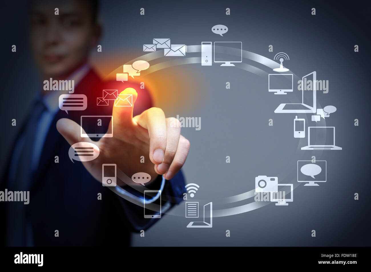 Business person pushing symbols on a touch screen interface Stock Photo ...