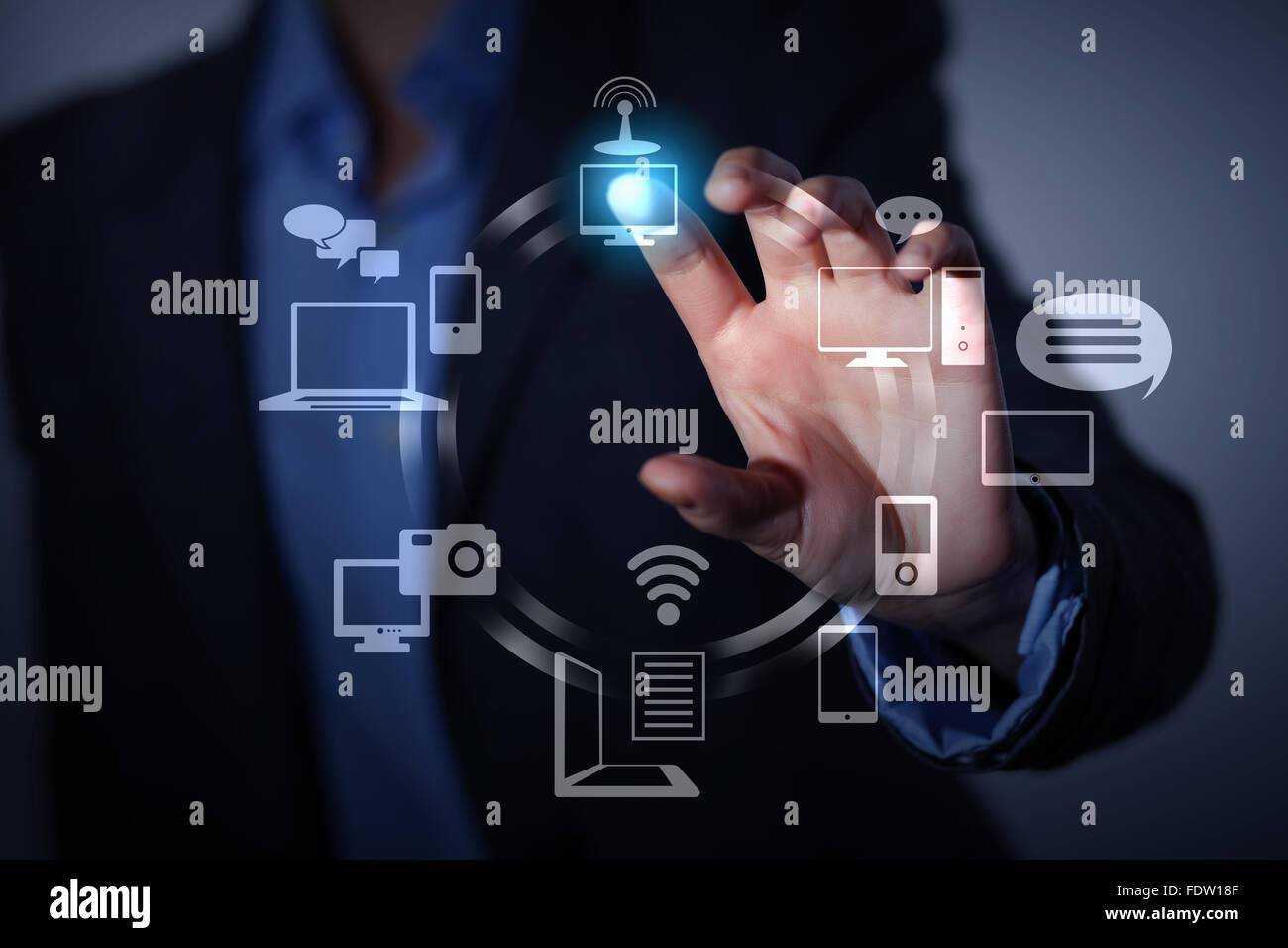 Business person pushing symbols on a touch screen interface Stock Photo ...