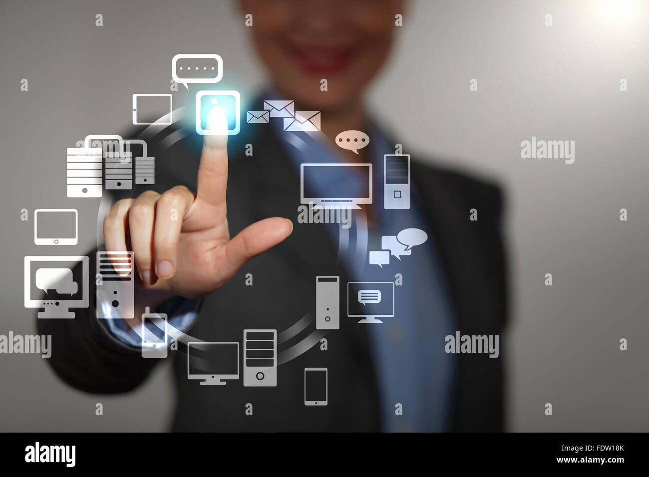 Business person pushing symbols on a touch screen interface Stock Photo ...