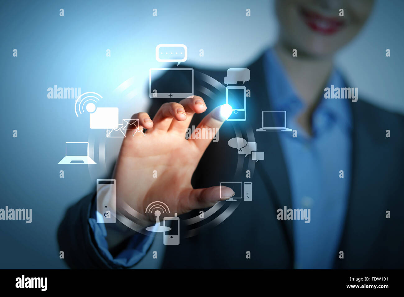 Business person pushing symbols on a touch screen interface Stock Photo ...