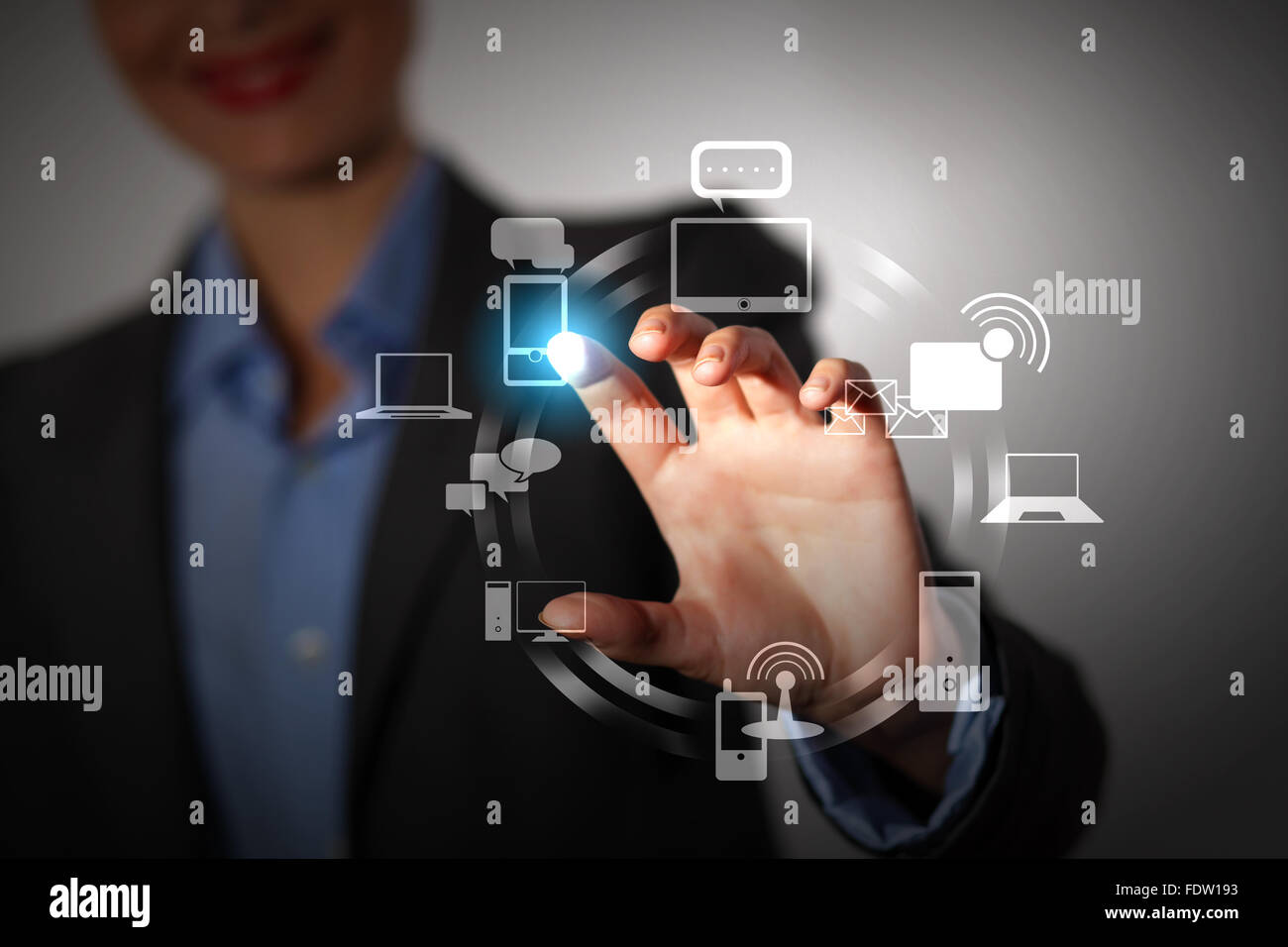 Business person pushing symbols on a touch screen interface Stock Photo ...