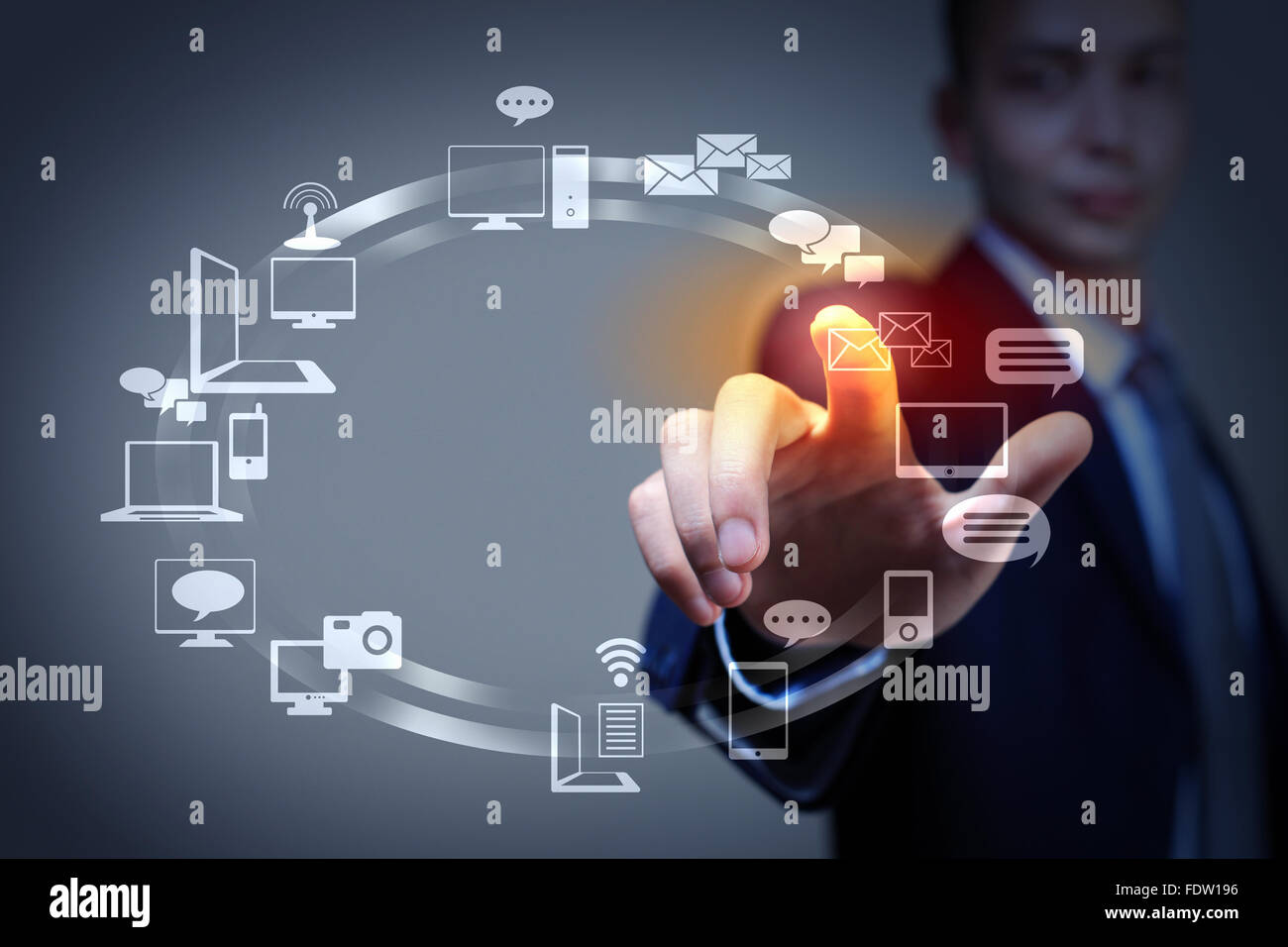 Business person pushing symbols on a touch screen interface Stock Photo ...