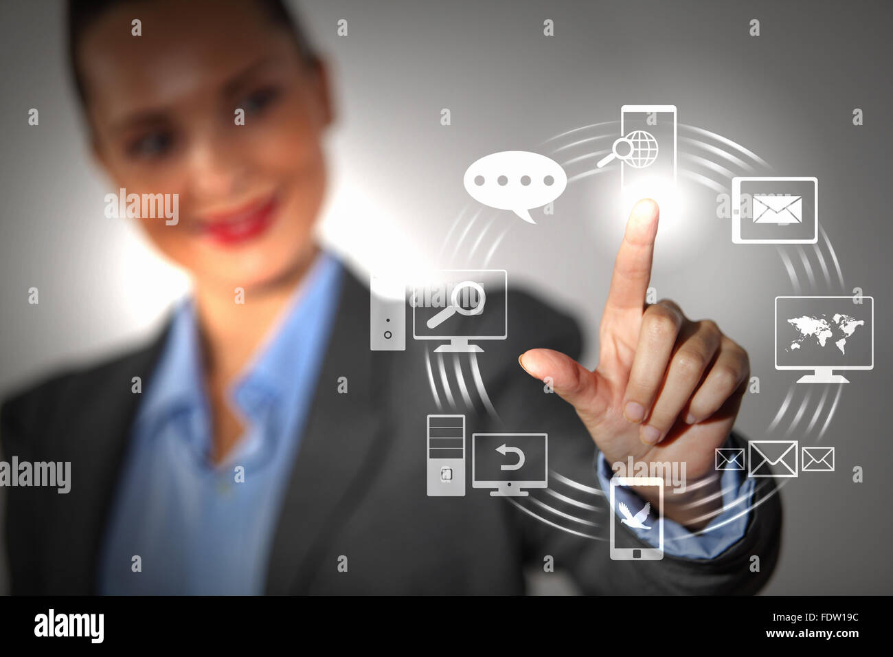 Business person pushing symbols on a touch screen interface Stock Photo ...