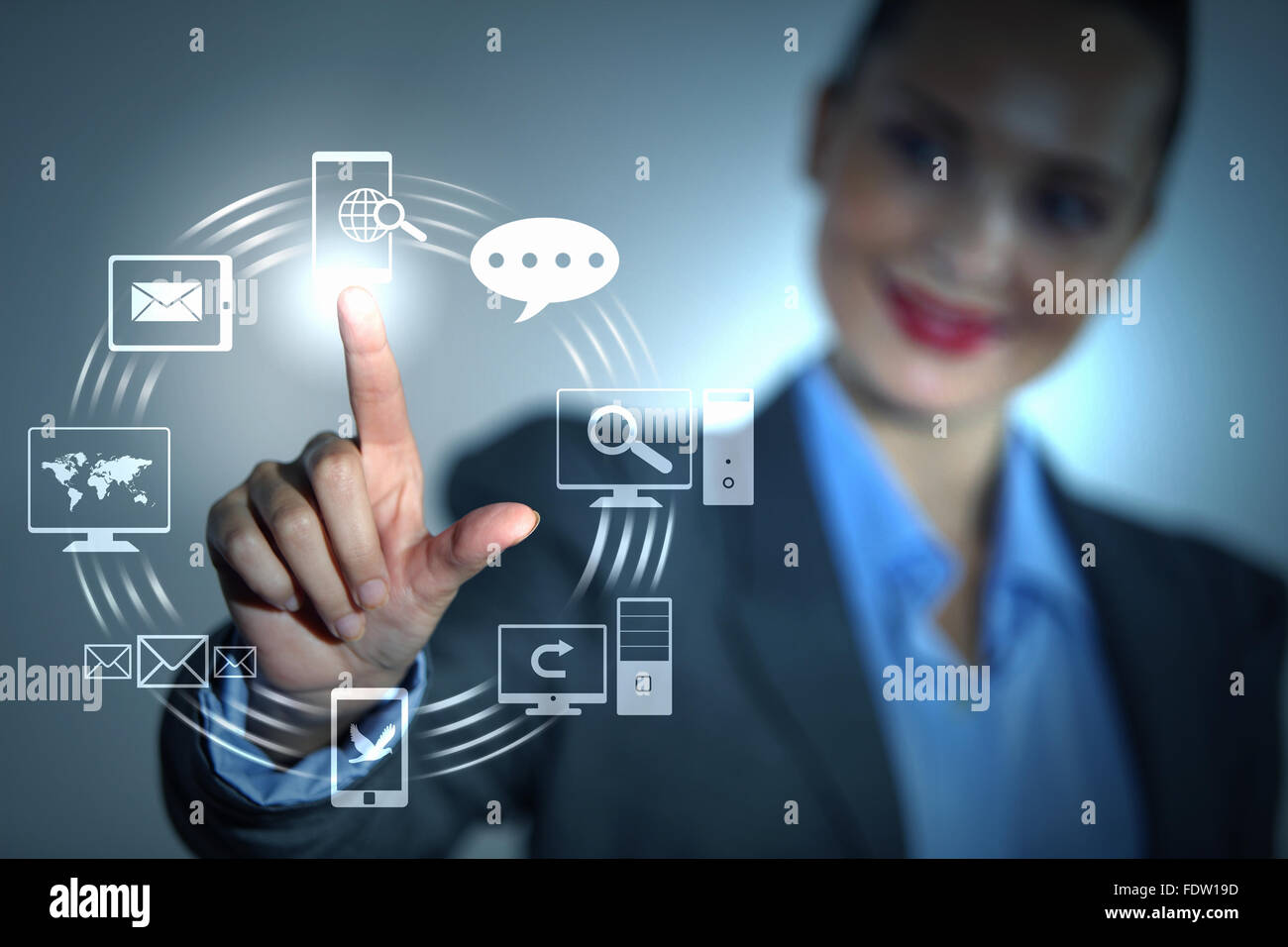 Business person pushing symbols on a touch screen interface Stock Photo ...
