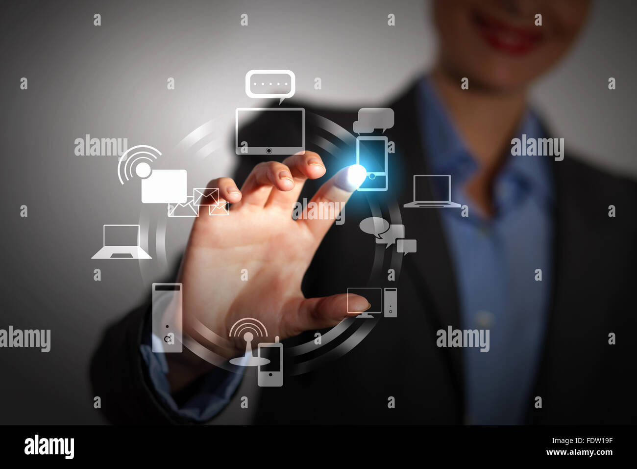 Business person pushing symbols on a touch screen interface Stock Photo ...