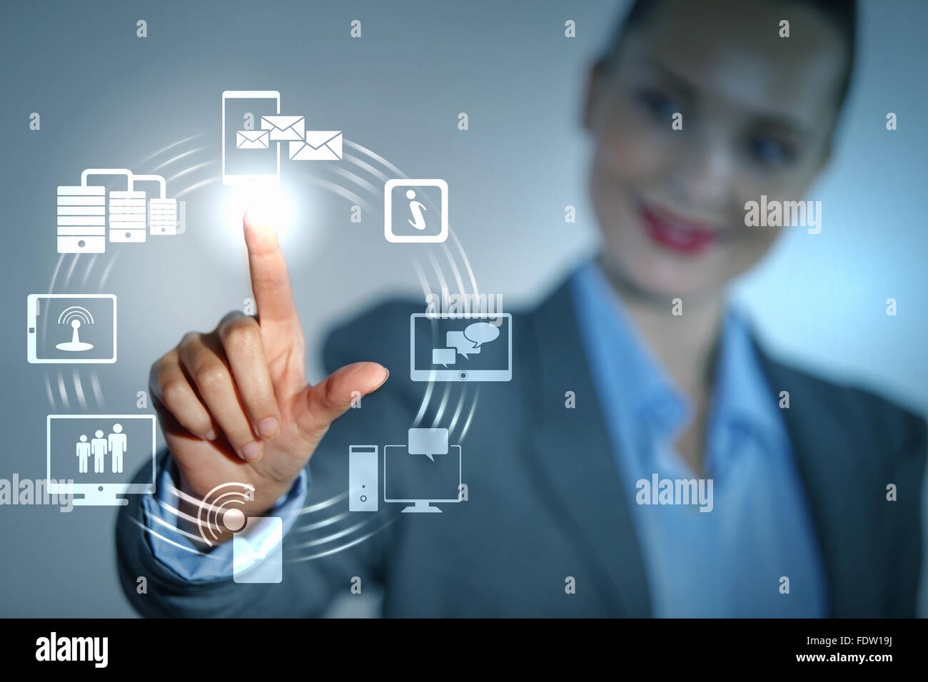 Business person pushing symbols on a touch screen interface Stock Photo ...