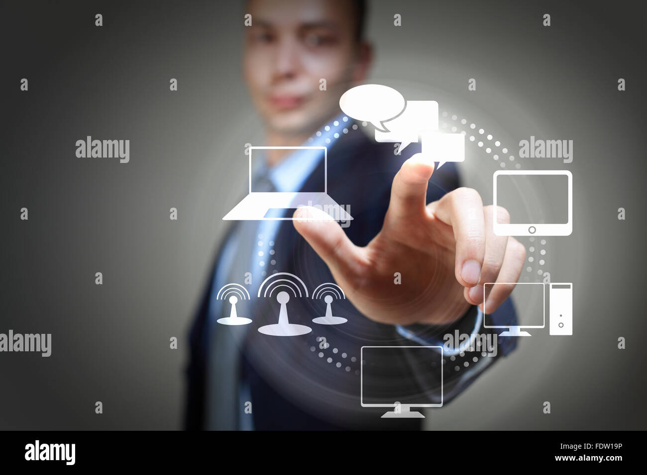 Business person pushing symbols on a touch screen interface Stock Photo ...