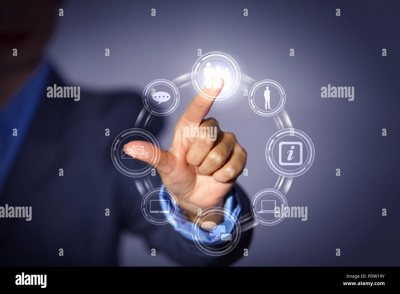 Business person pushing symbols on a touch screen interface Stock Photo ...