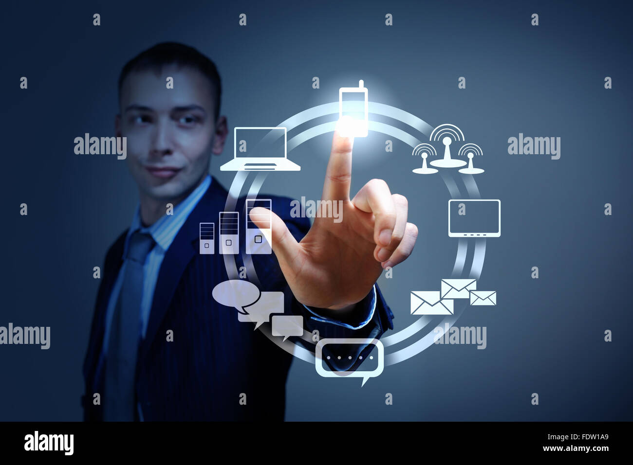 Business person pushing symbols on a touch screen interface Stock Photo ...