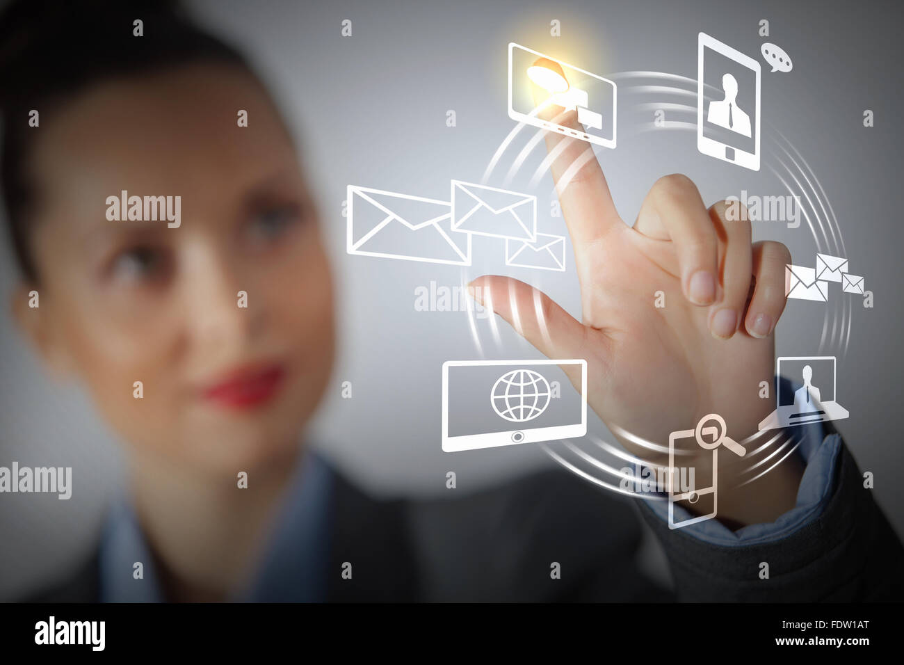 Business person pushing symbols on a touch screen interface Stock Photo ...