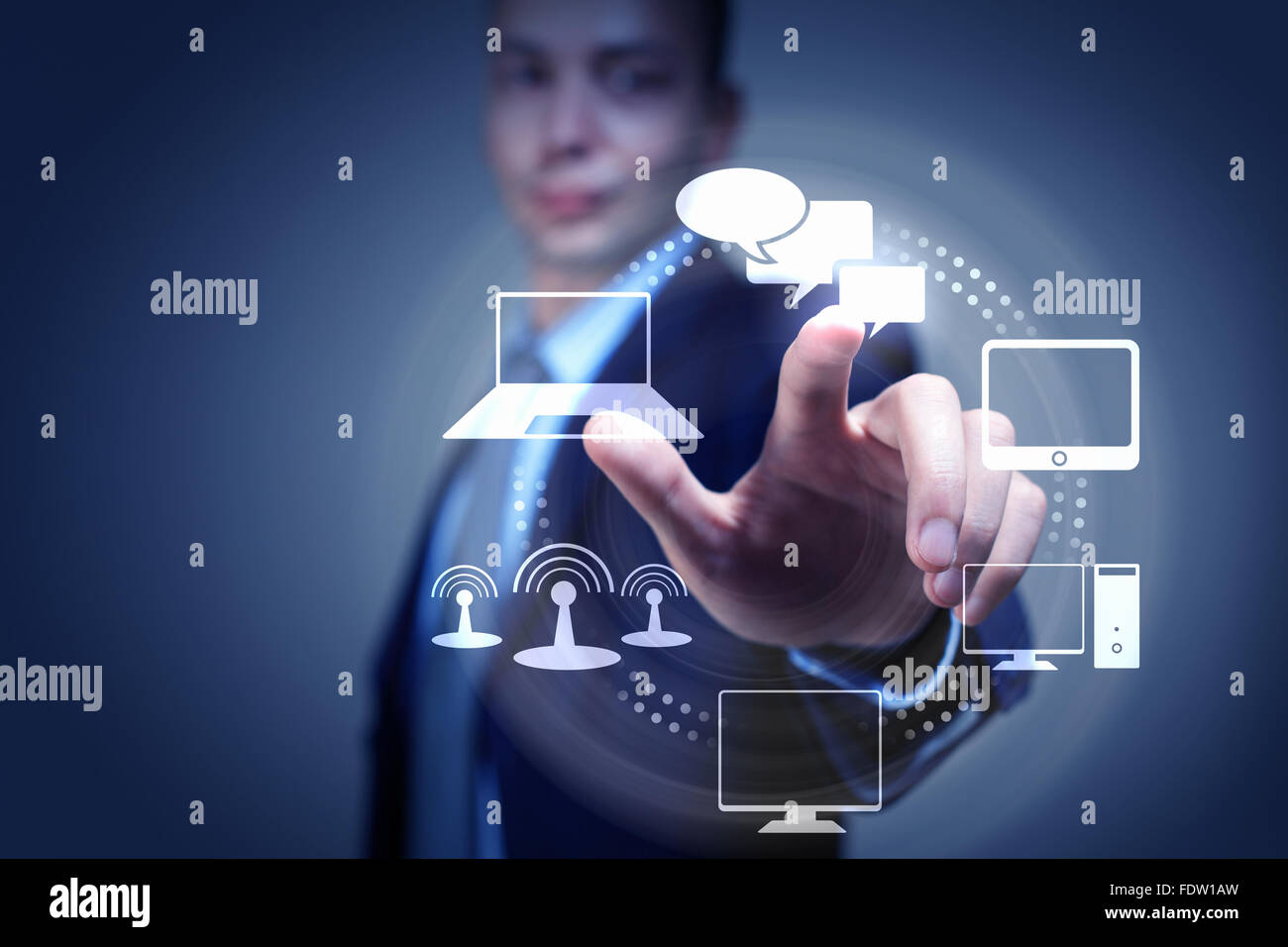 Business person pushing symbols on a touch screen interface Stock Photo ...