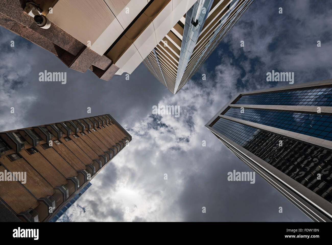 Three tall skyscrapers viewed from bottom looking up Stock Photo - Alamy
