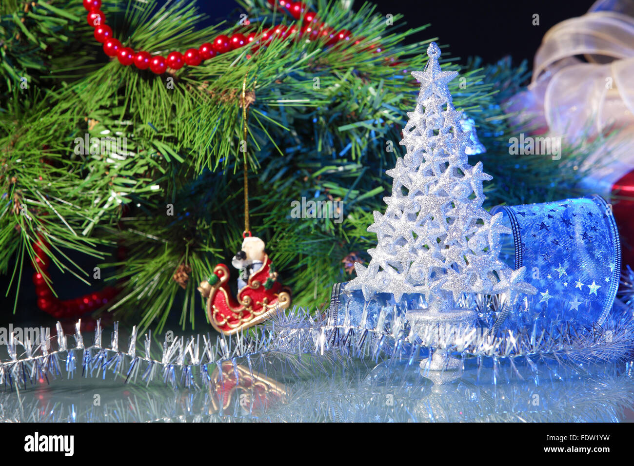 Beautiful Decorated Christmas tree on a darl background Stock Photo - Alamy