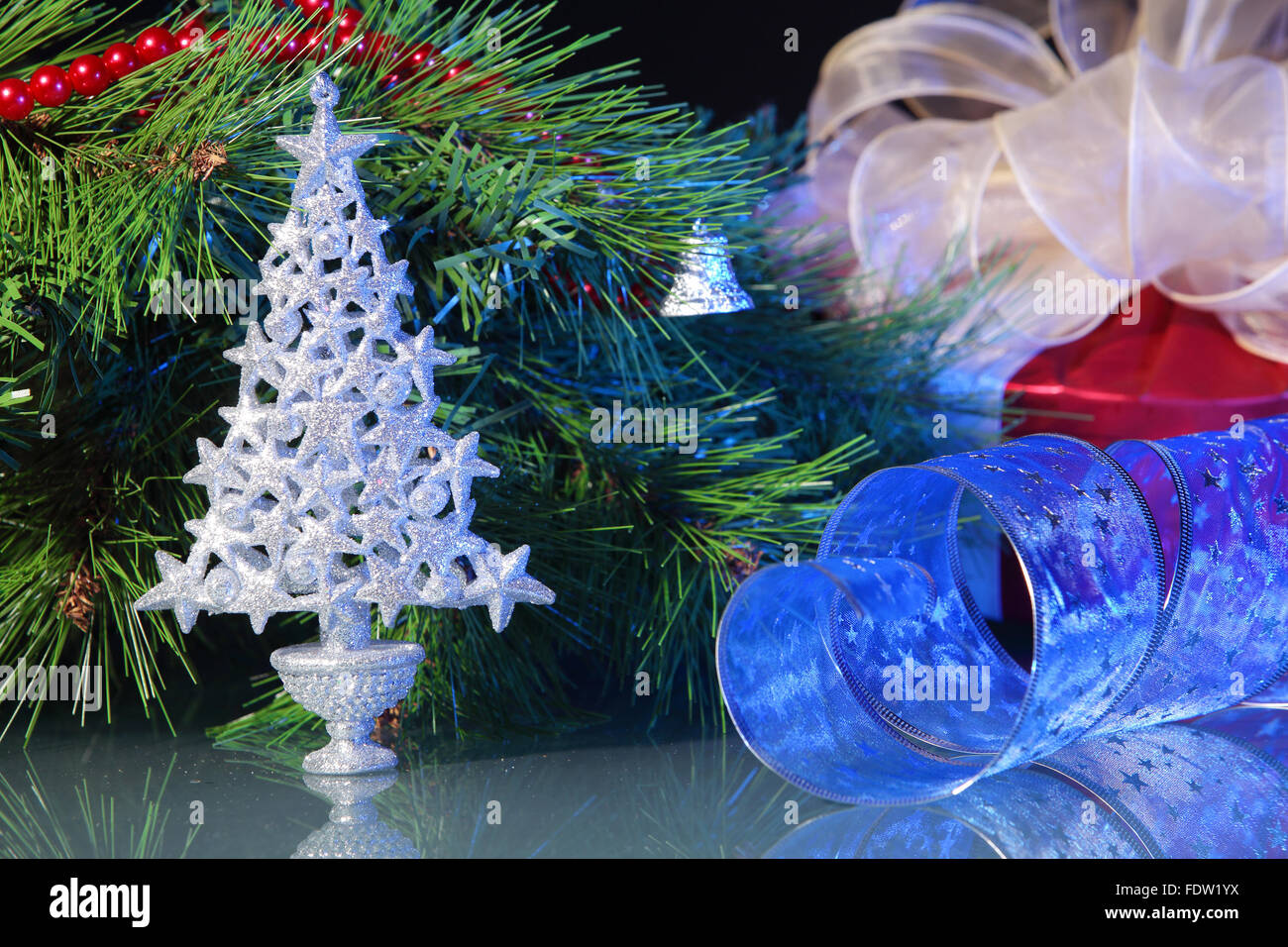 Beautiful Decorated Christmas tree on a darl background Stock Photo - Alamy