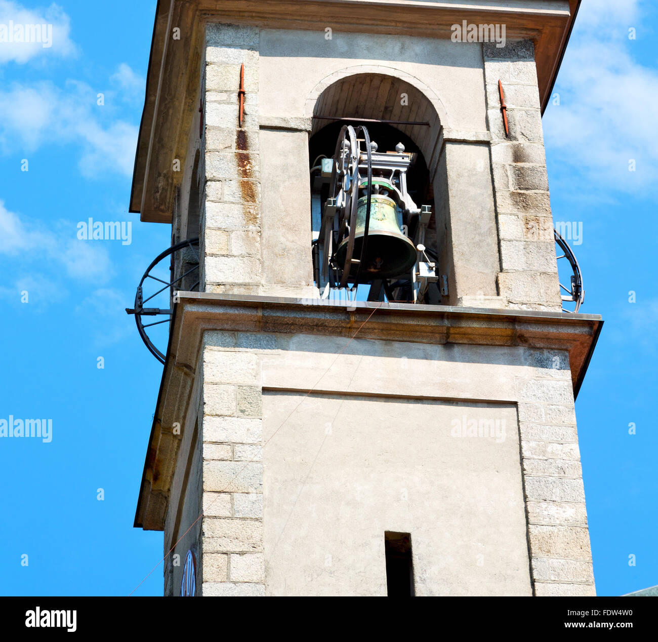 ancien clock tower in italy europe old stone and bell Stock Photo - Alamy