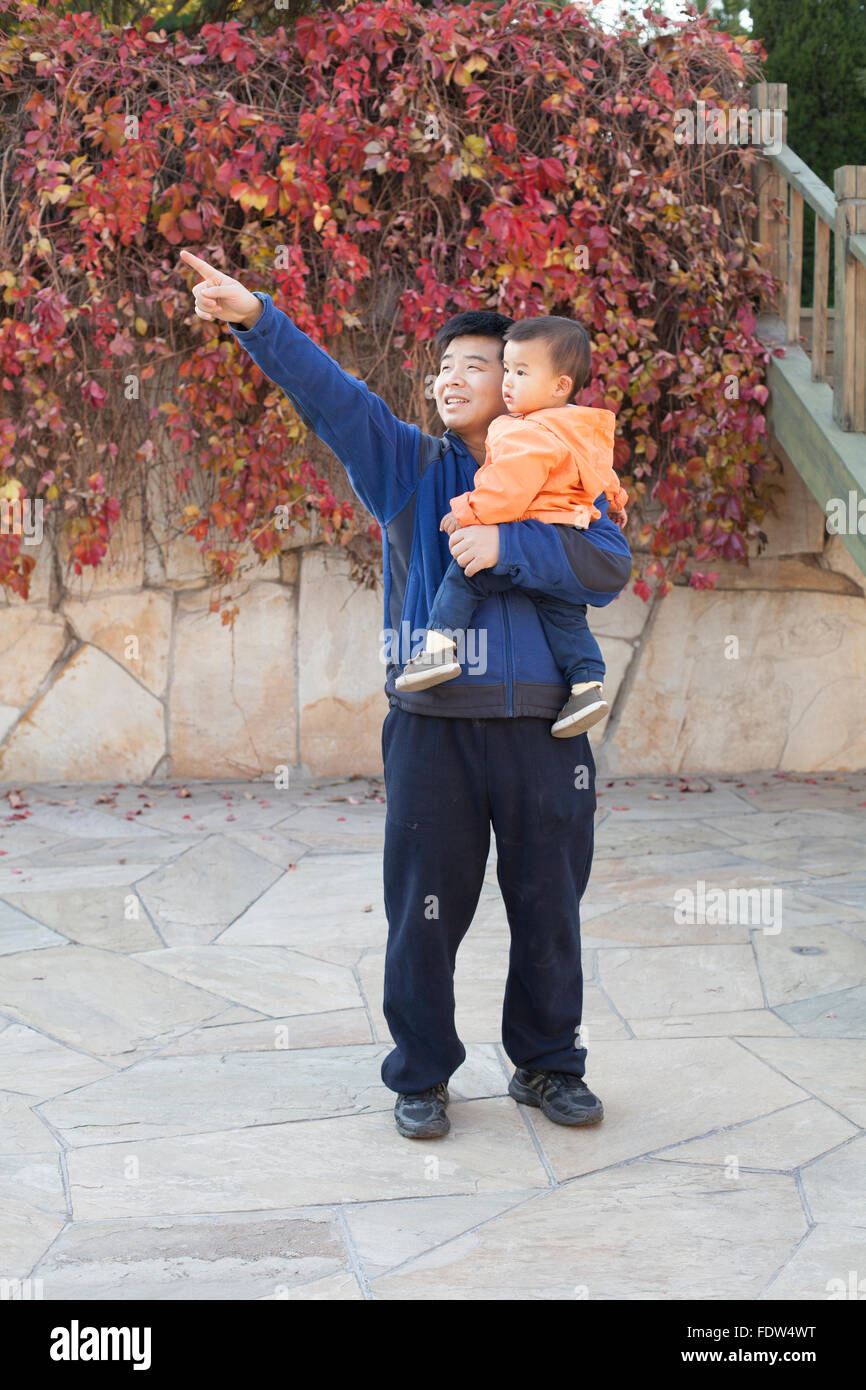 Chinese boys pointing hi-res stock photography and images - Alamy