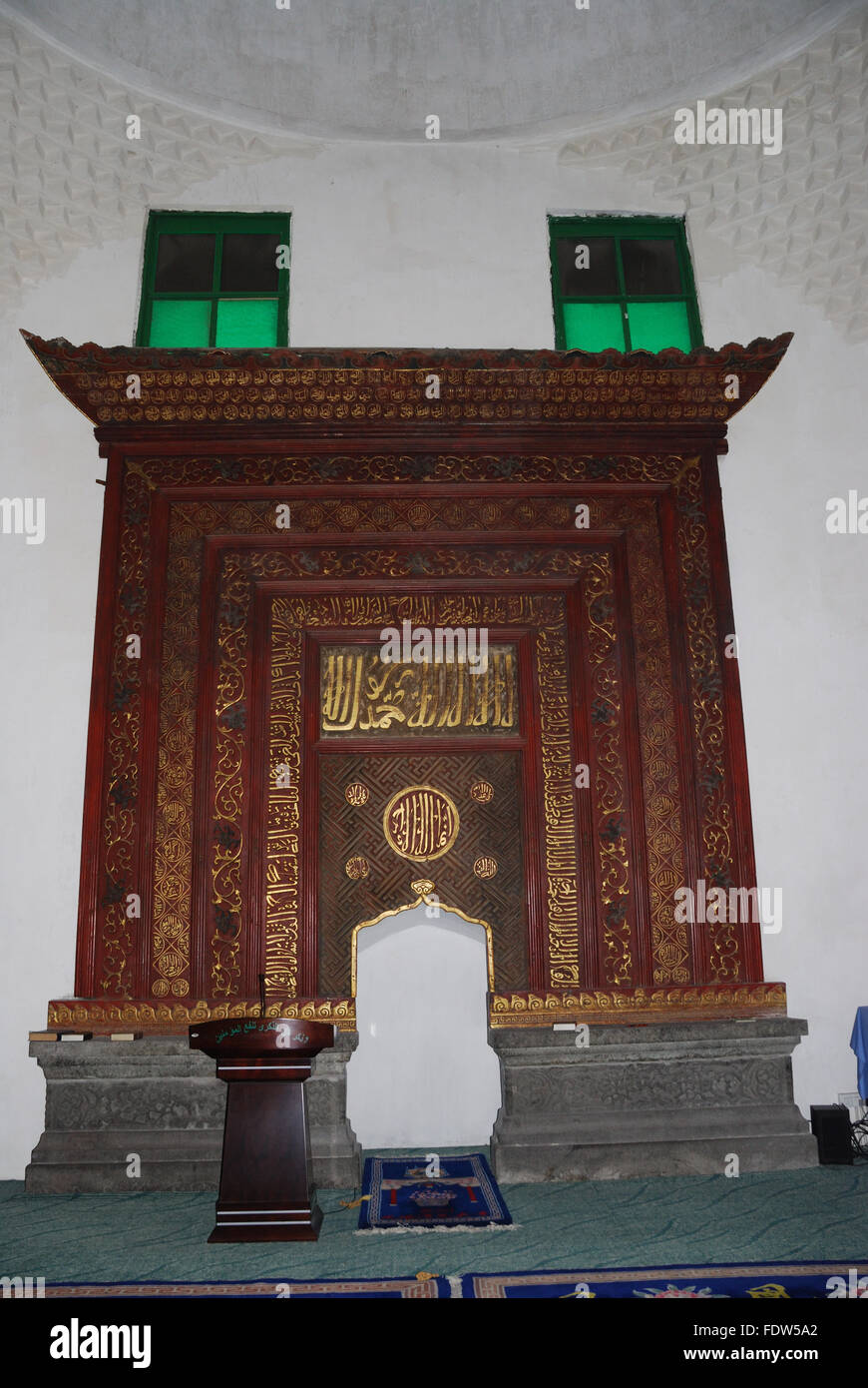 Calligraphy on the Mehrab of the Phoenix Mosque. Prayer mat inside the ...