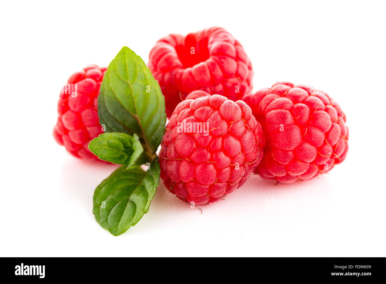 Raspberries with leaves isolated on white background Stock Photo - Alamy