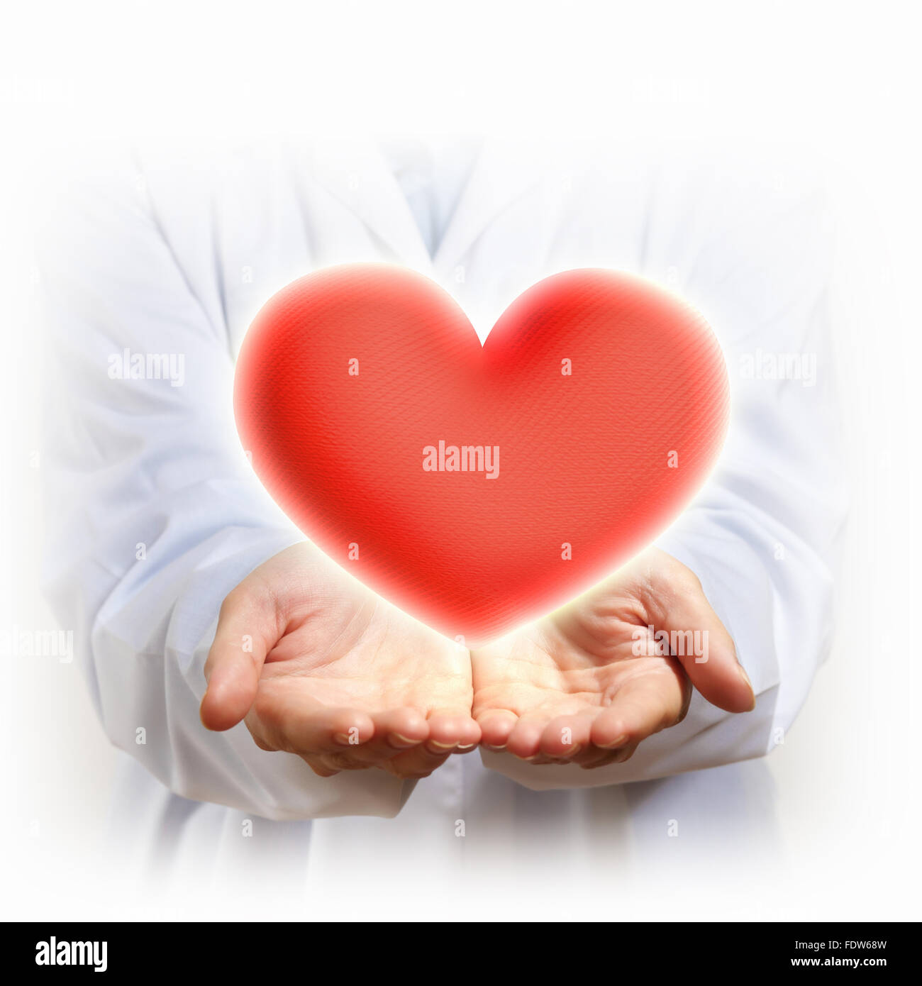 A Big Red Heart in thehand of a person Stock Photo - Alamy