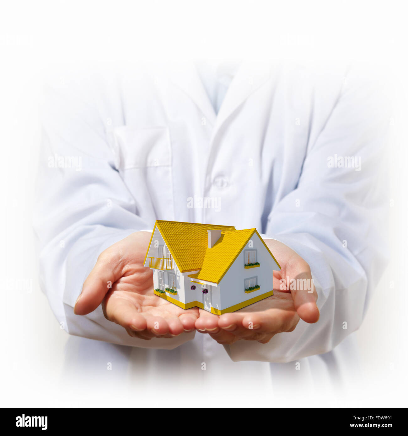 Residential building and a businessman holding it in his hands Stock ...