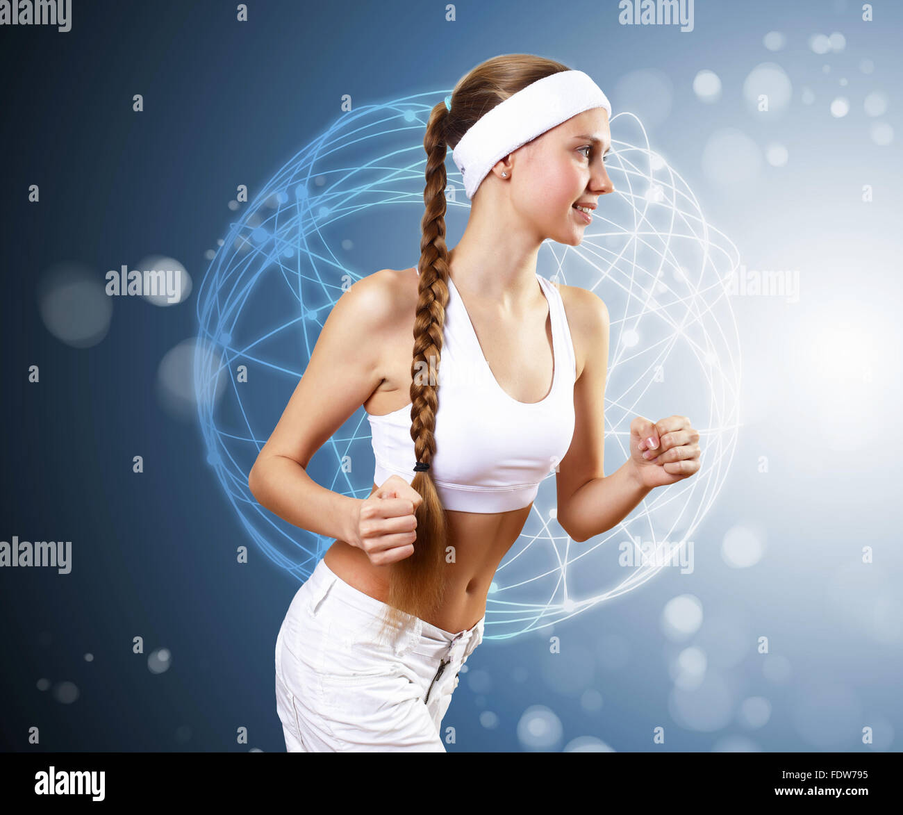 Young pretty woman in sport wear running Stock Photo - Alamy