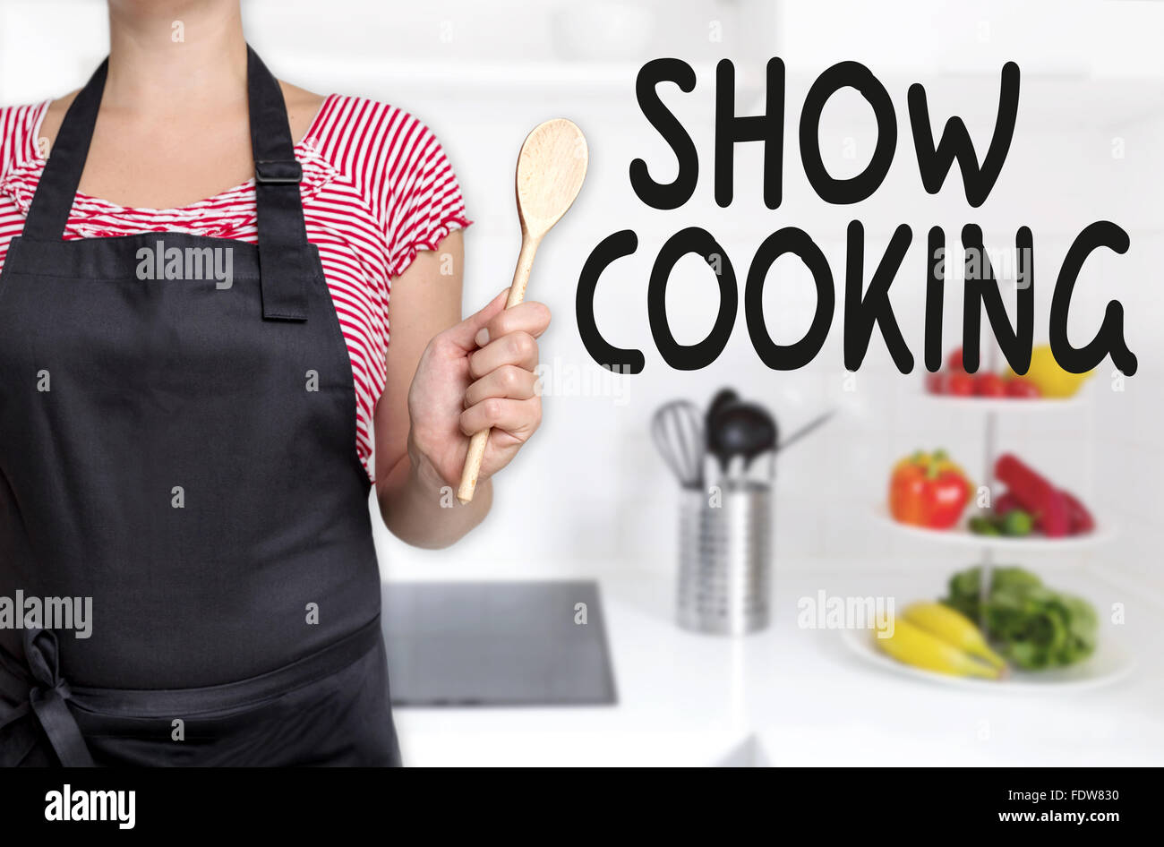 show cooking cook holding wooden spoon background concept Stock Photo ...