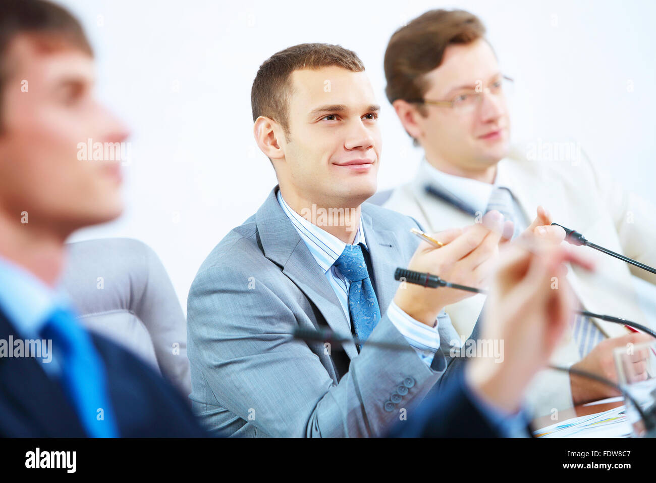 Group of business people at conference hall at the start of the ...