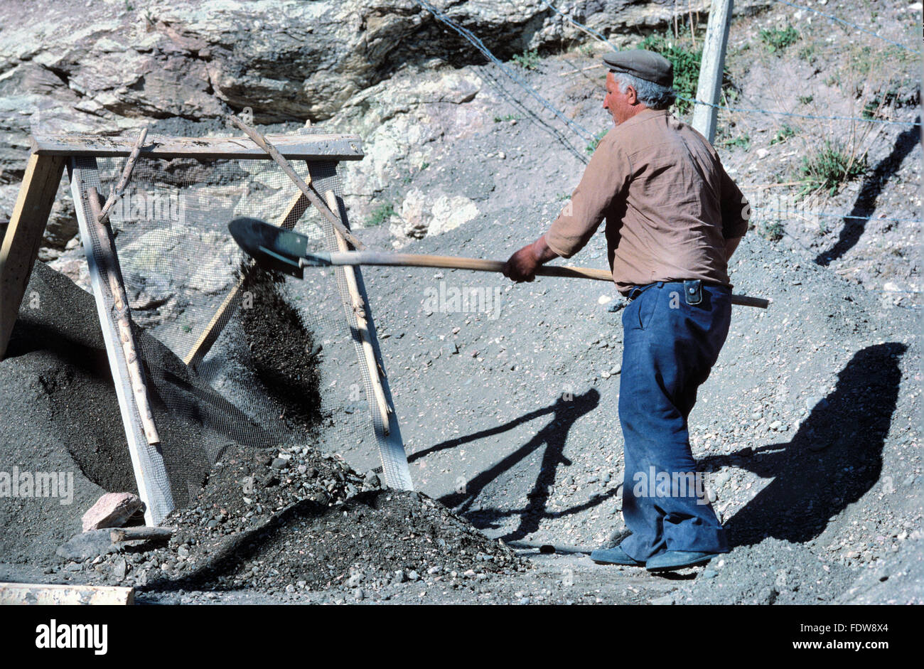 Turkish Manual Worker Workman or Construction Worker Sifting Gravel to ...