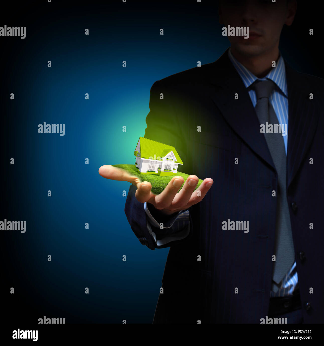 Residential building and a businessman holding it in his hands Stock ...