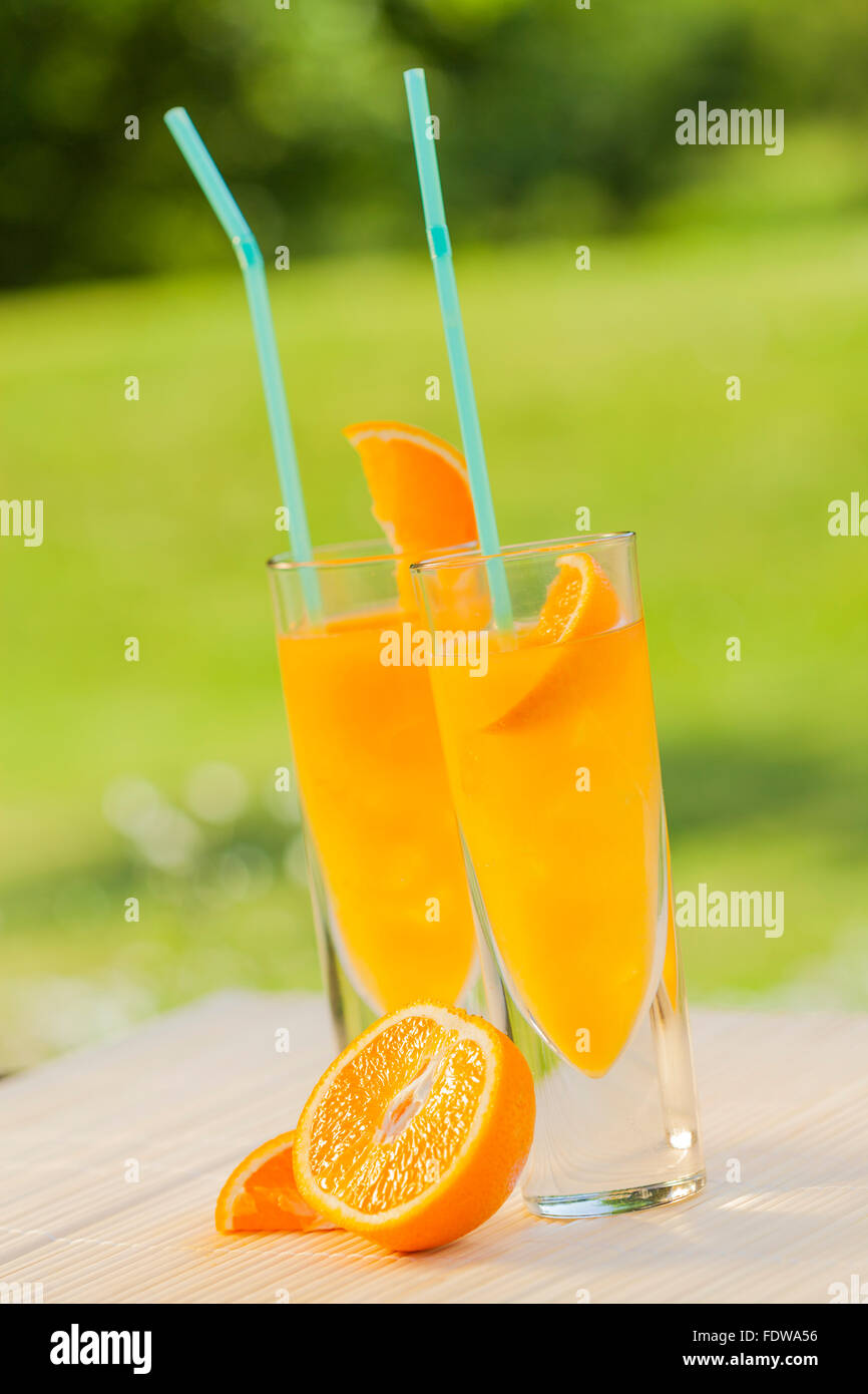 ice cold healthy orange juice spritzer drink in garden Stock Photo - Alamy
