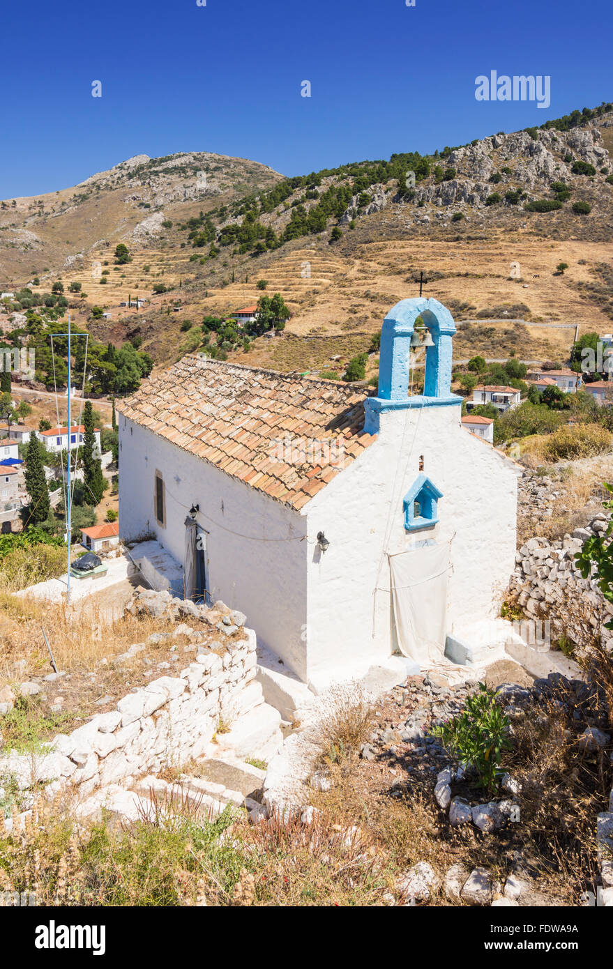 Small white church overlooking a Hydriot hillside, Hydra Island, Greece ...