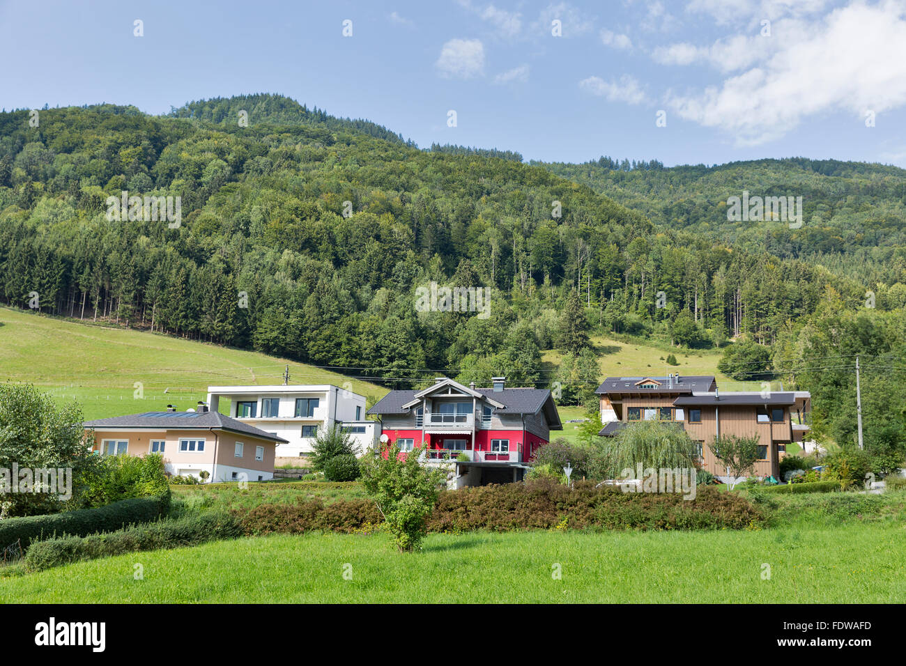 landscape with small residential houses in Austrian Alps Stock Photo ...