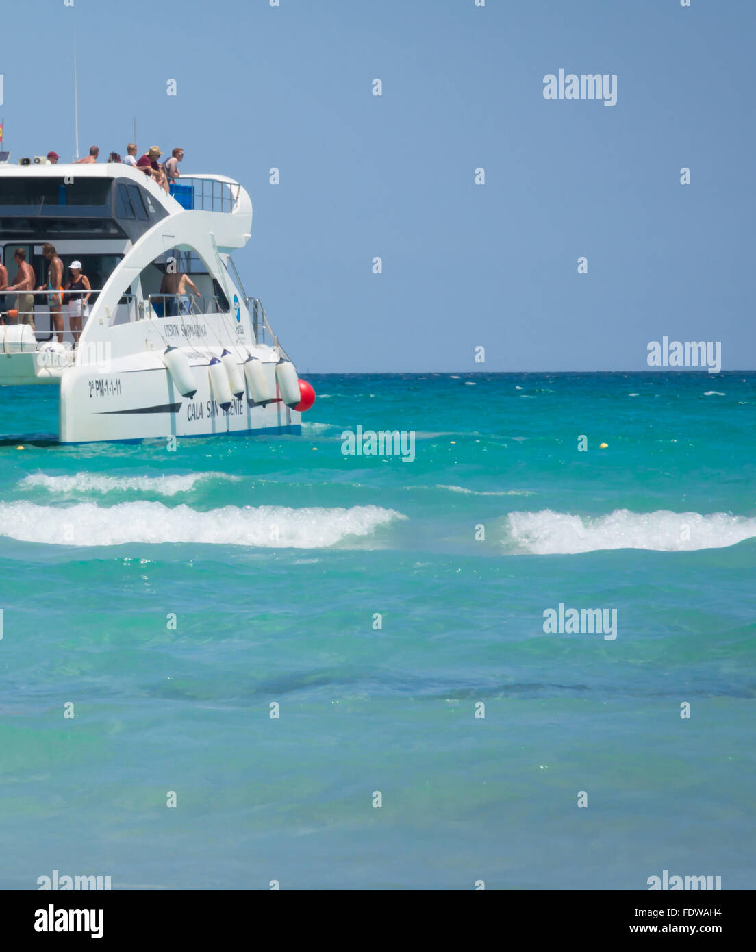 Catamaran tour boat and azure blue Mediterranean color ocean Stock ...