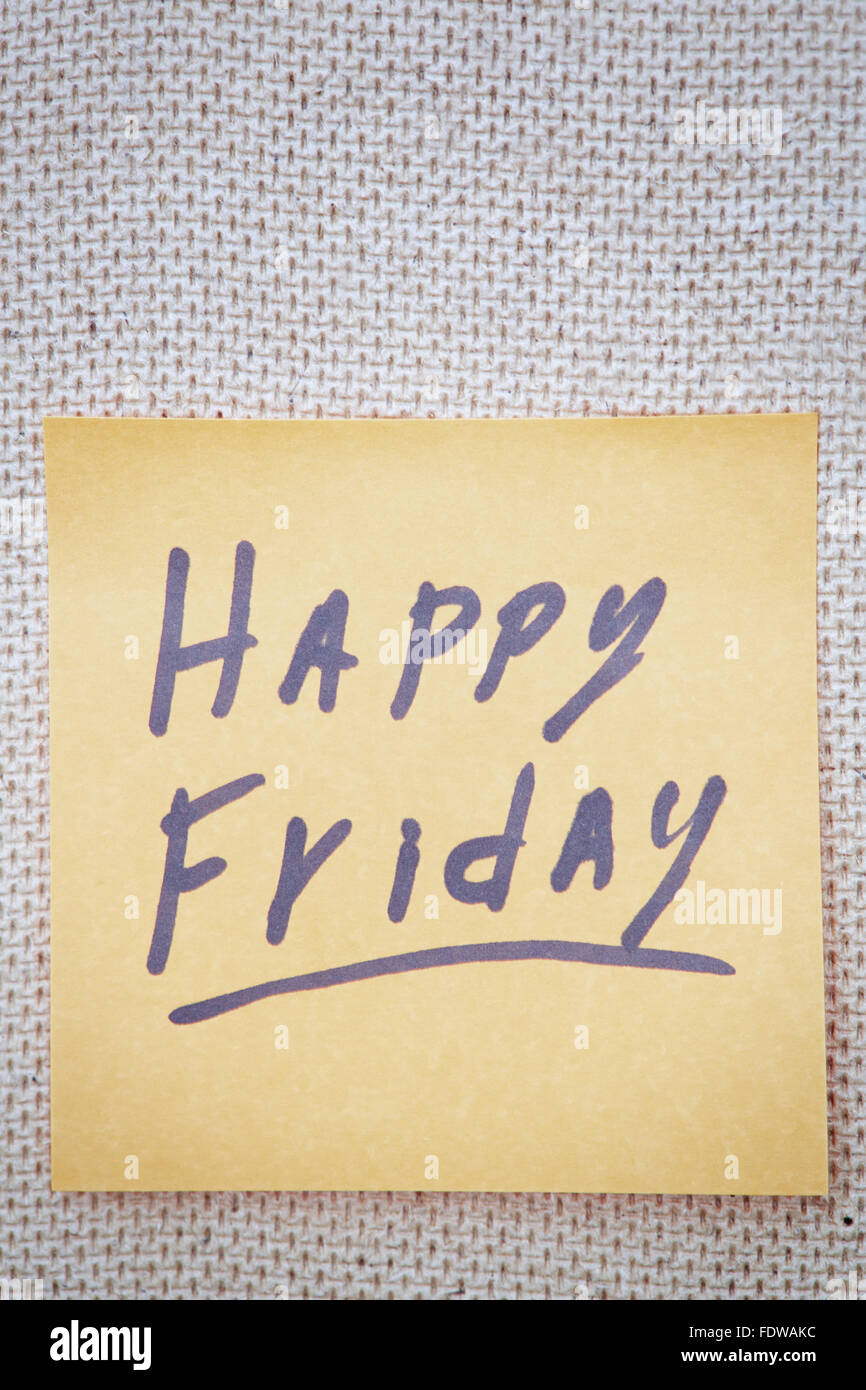 Adhesive note with Happy Friday text on a cork bulletin board Stock ...