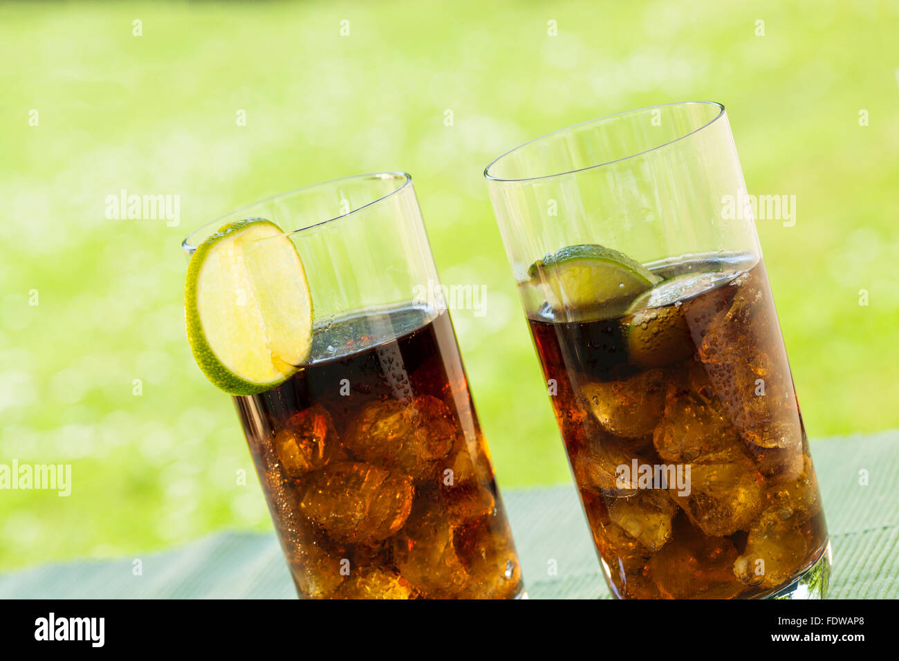 ice cold cola summer drink in garden Stock Photo - Alamy