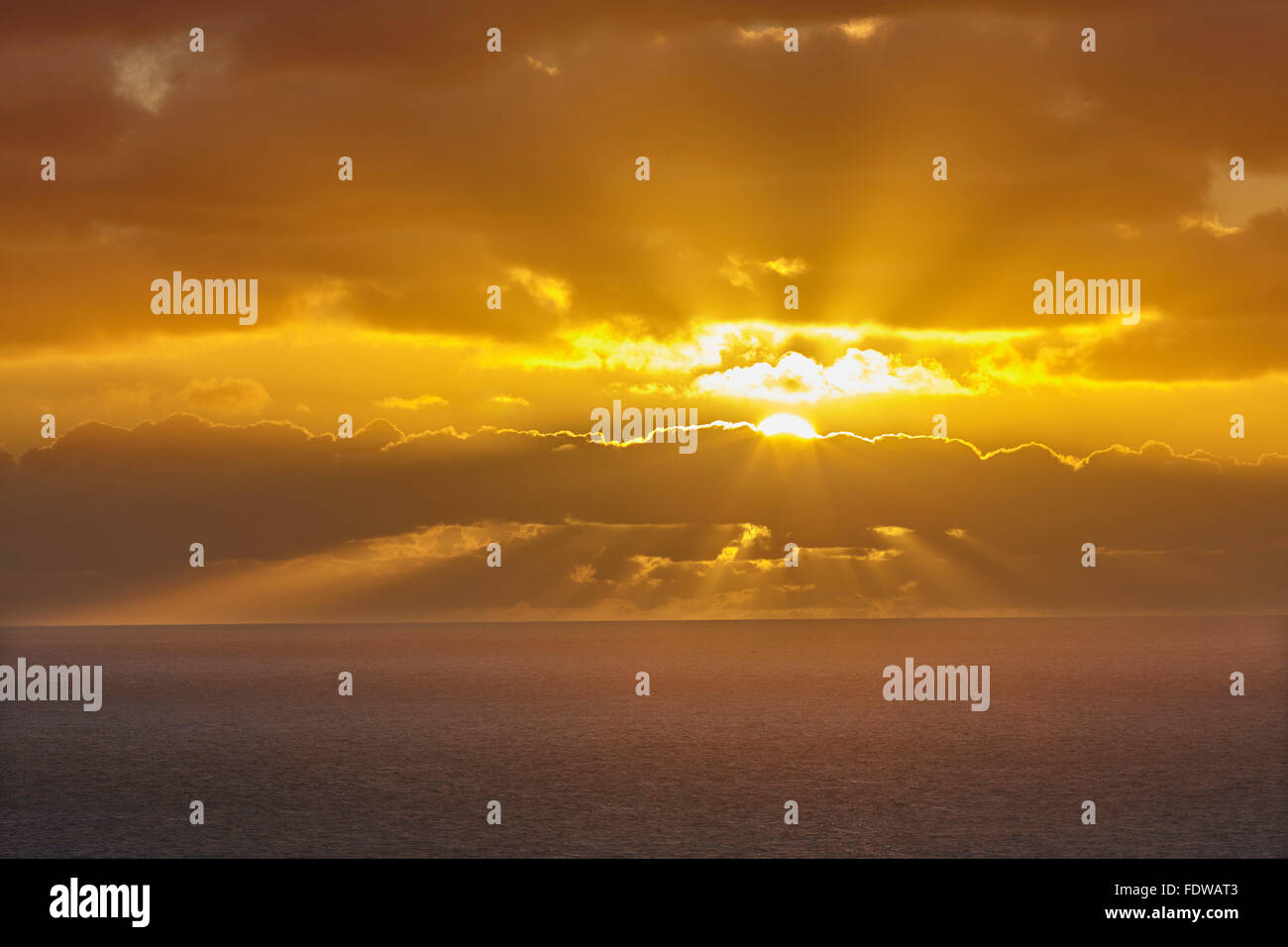 Sunrise over the sea, seen from Rame Head, near Torpoint, Cornwall ...