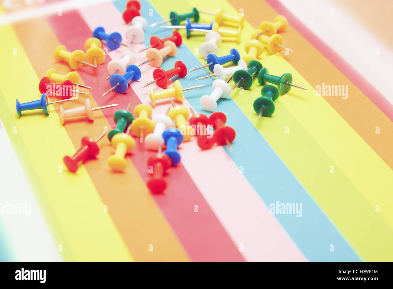 Close-up view on a multicolored set of pushpins Stock Photo - Alamy