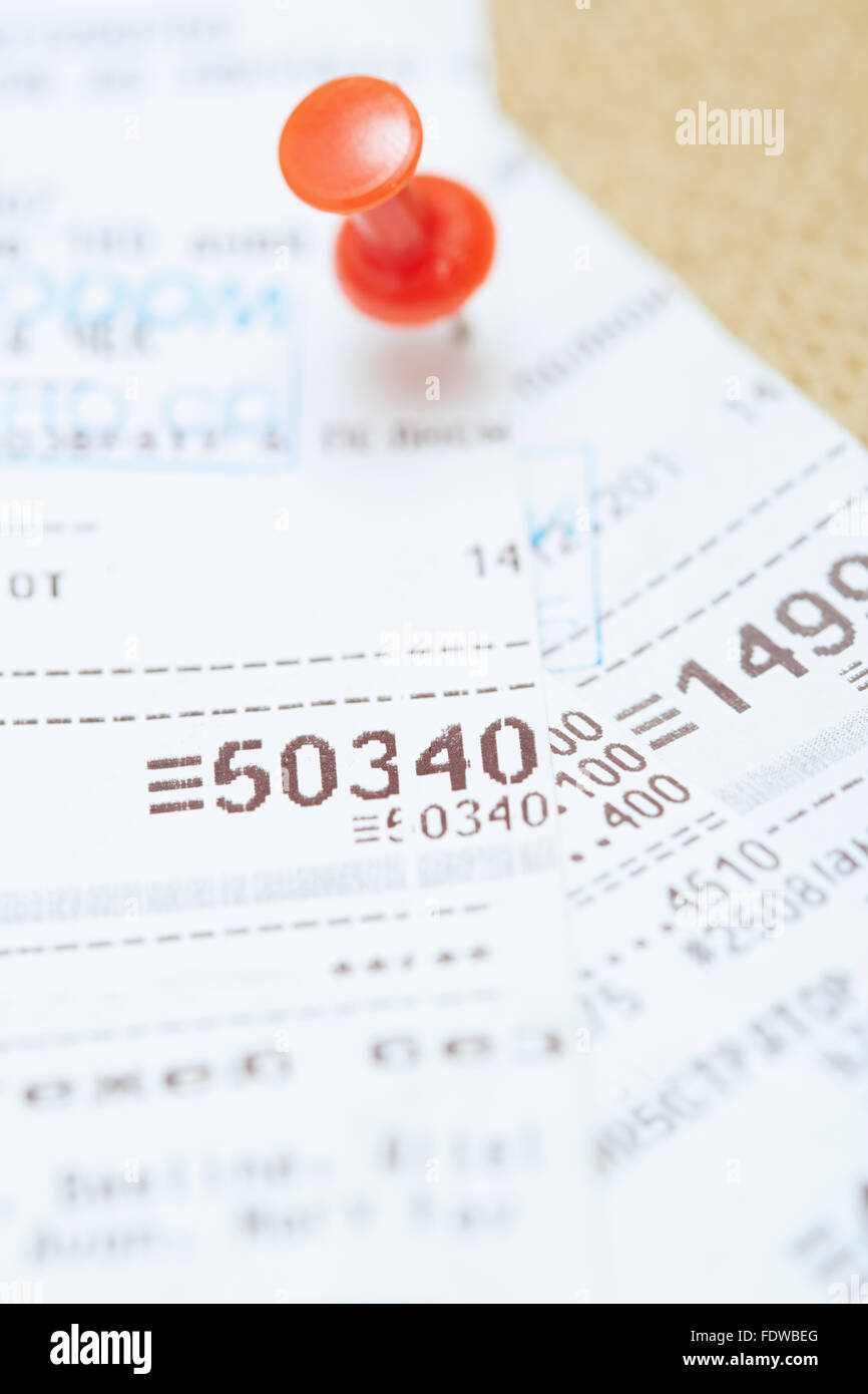 Cash register with pushpin. Close-up photo Stock Photo - Alamy