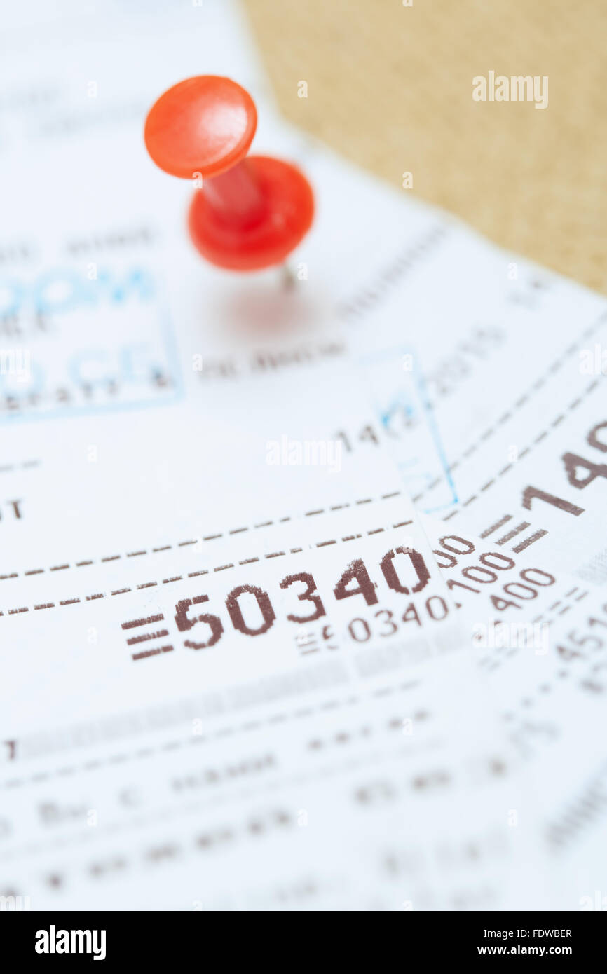 Cash register with pushpin. Close-up photo Stock Photo - Alamy