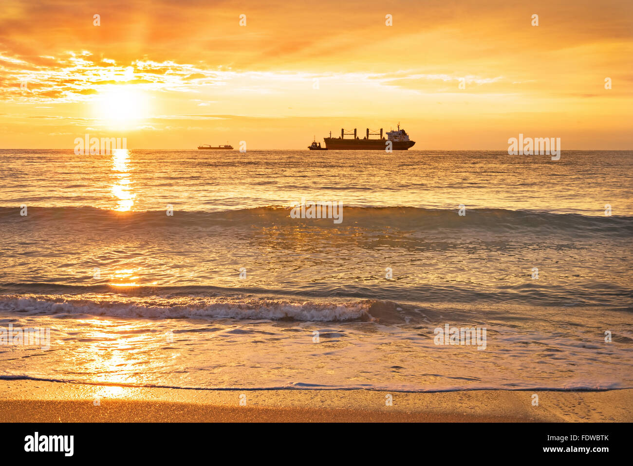 Ship, sea, sunset Stock Photo - Alamy