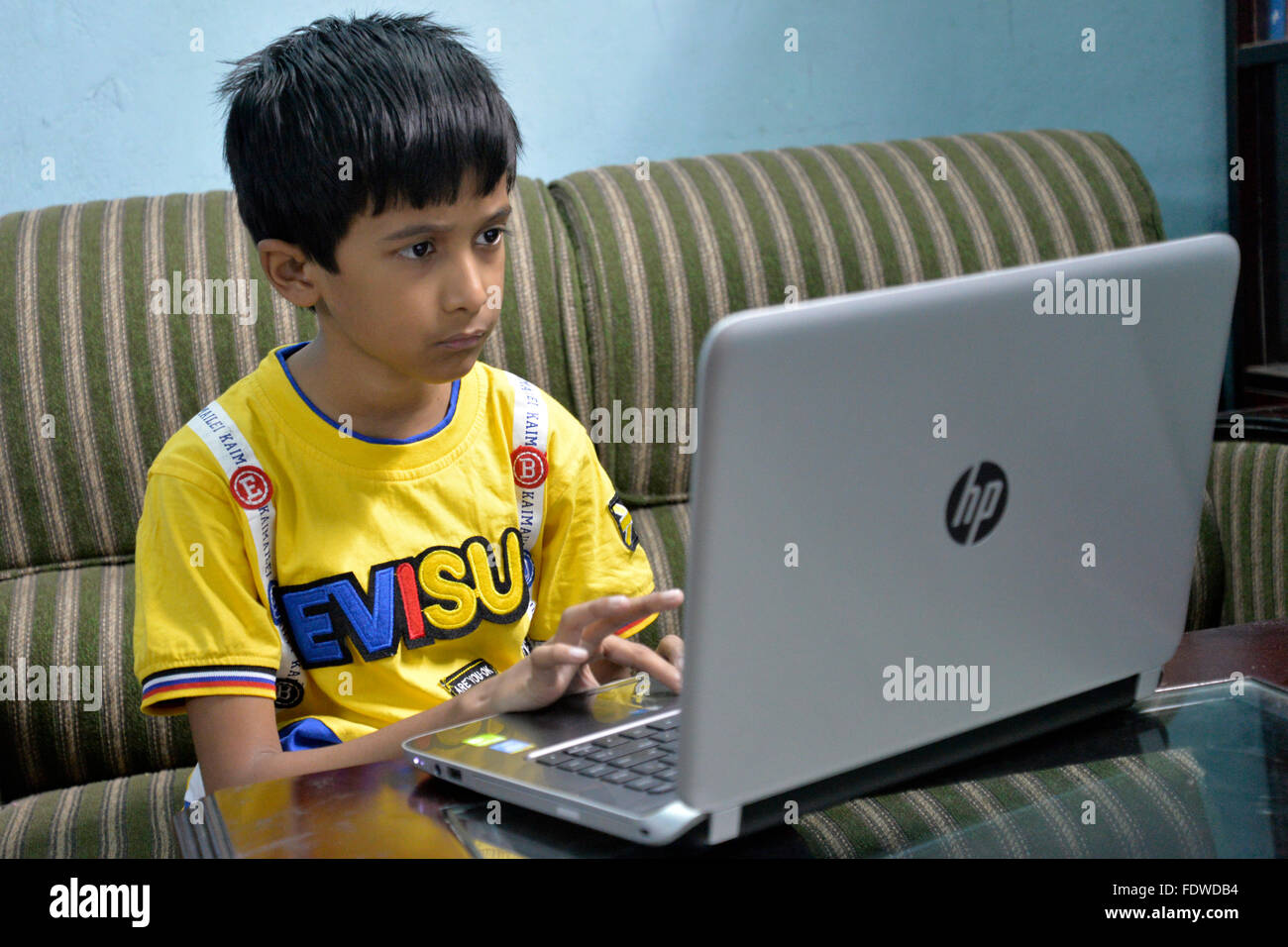Kids playing computer games in hi-res stock photography and images - Alamy