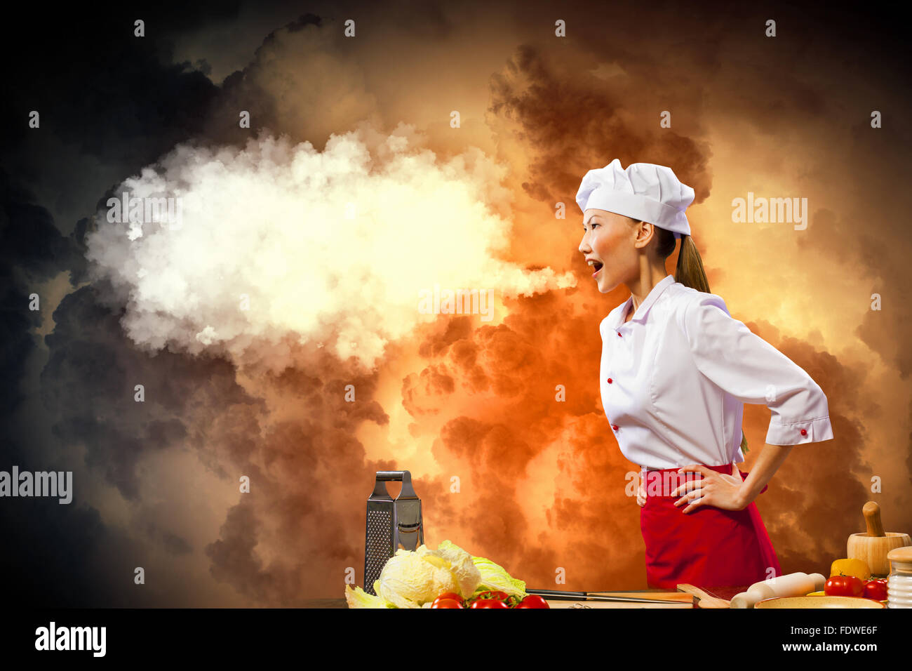 Asian female cook in anger against color background with shine effects ...
